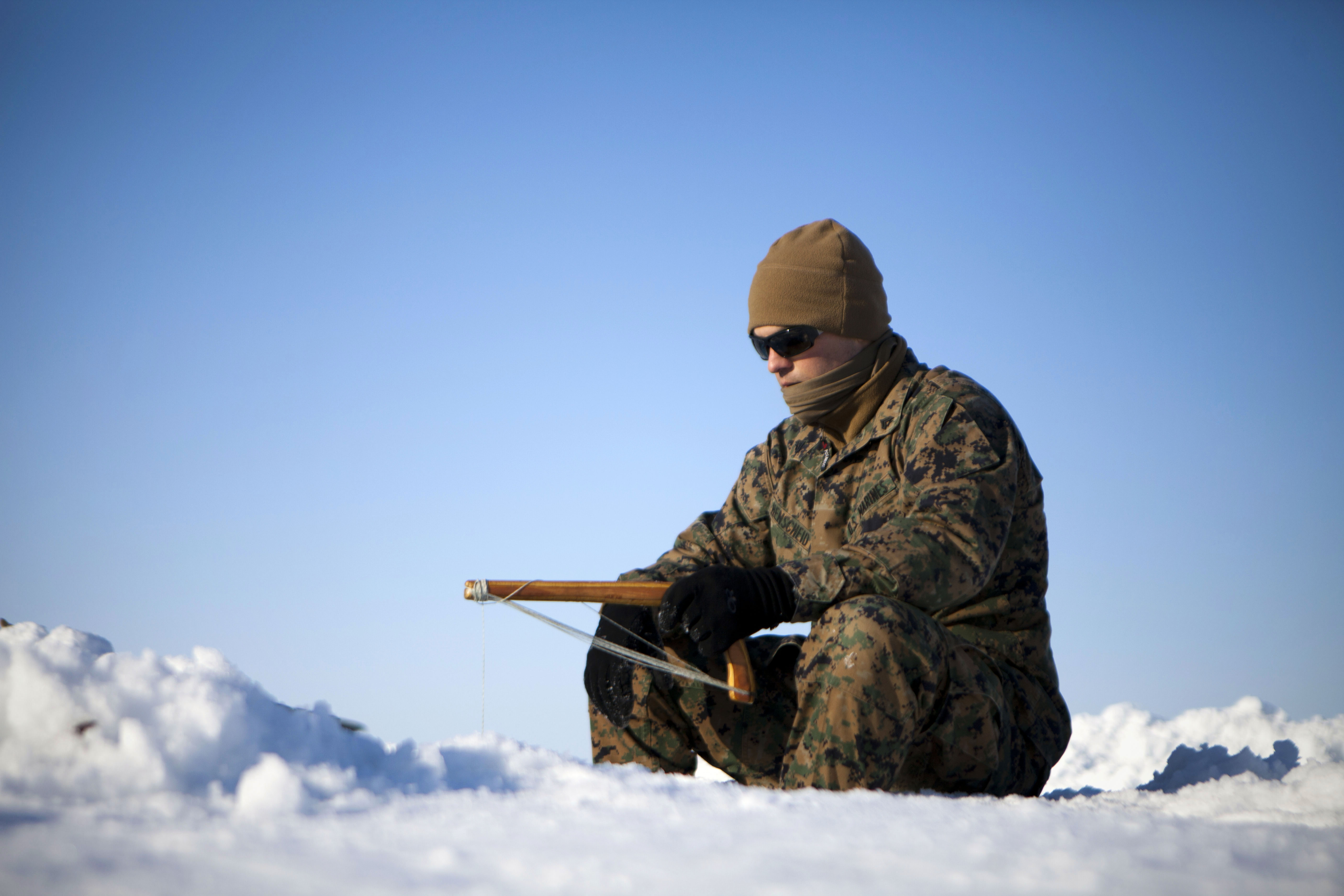 Marines ice fish with Alaskan natives > United States Marine Corps ...