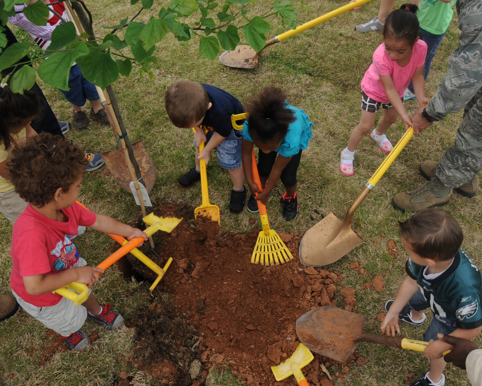 CDC children plant tree, recycle trash > Barksdale Air Force Base > Display