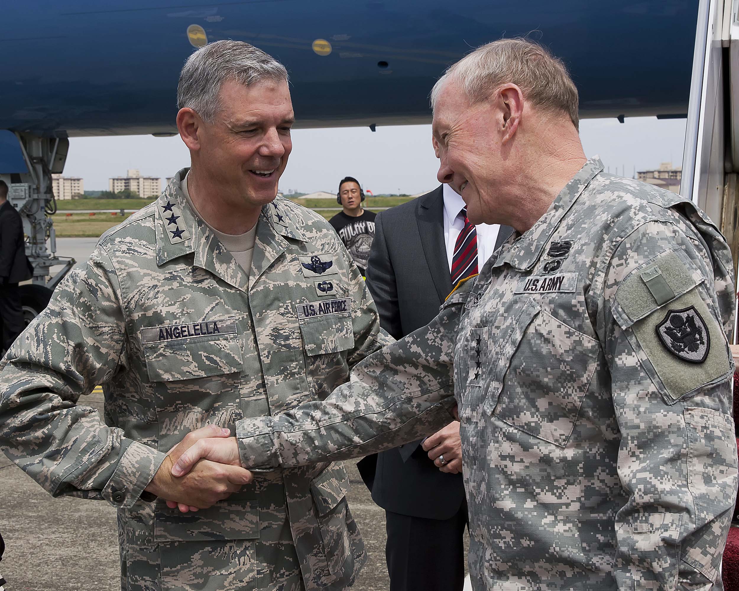 U.S. Air Force Lt. Gen. Salvatore A. “Sam” Angelella, left, commander ...