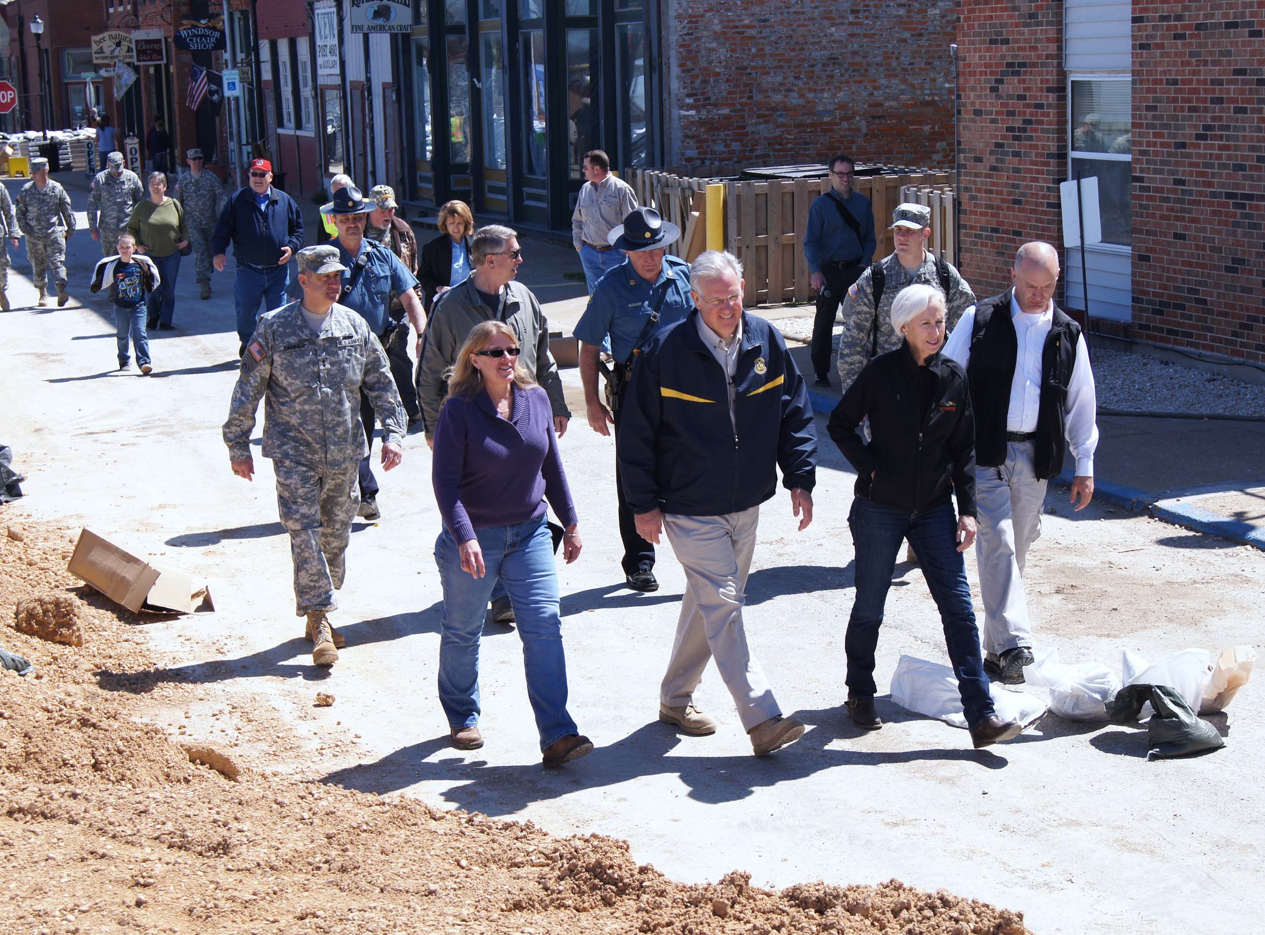 Missouri Gov. Jay Nixon, front center, and his wife, Georganne Nixon ...