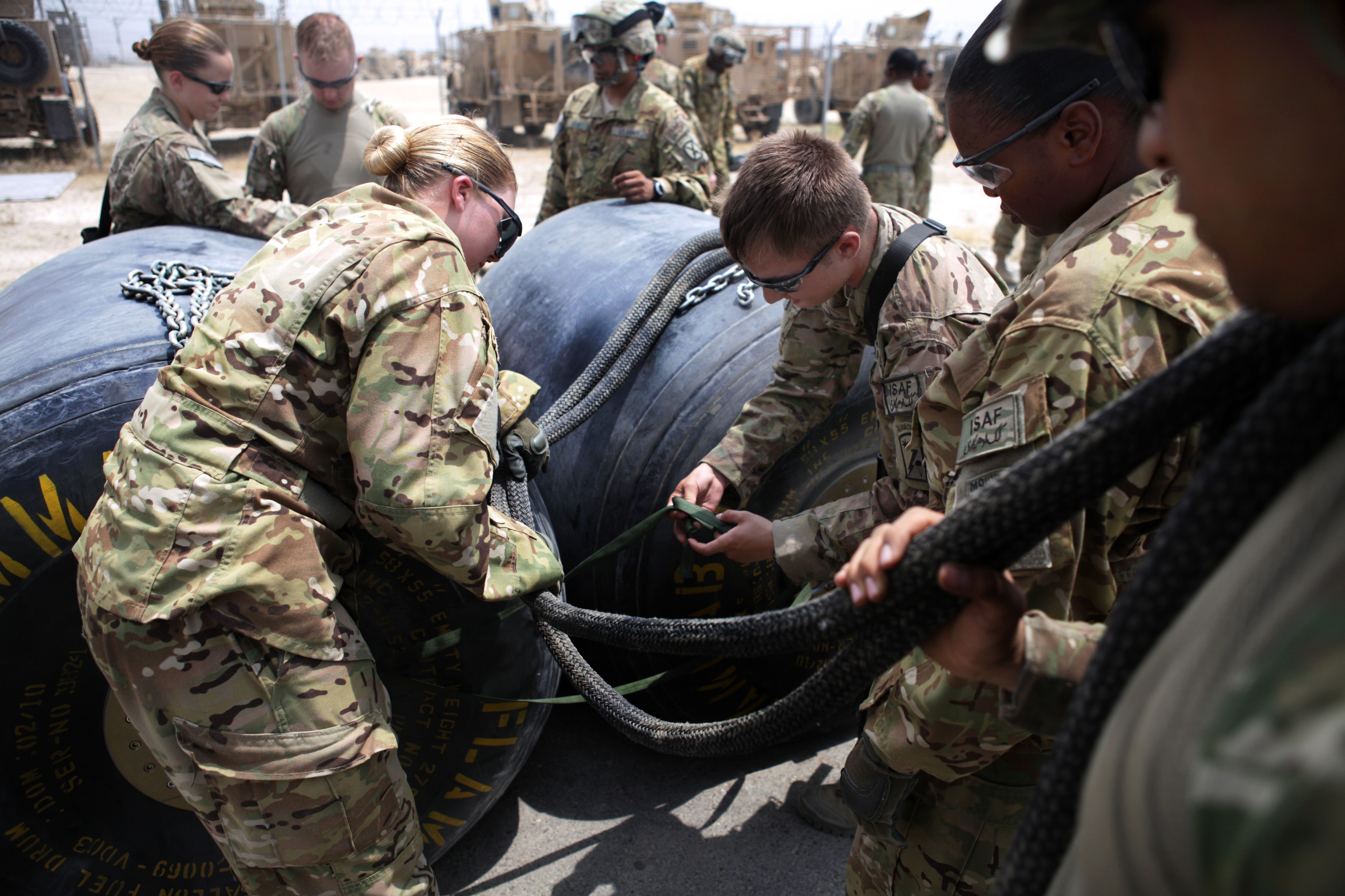 U.S. soldiers prepare two 500-gallon fuel blivets for slingload ...