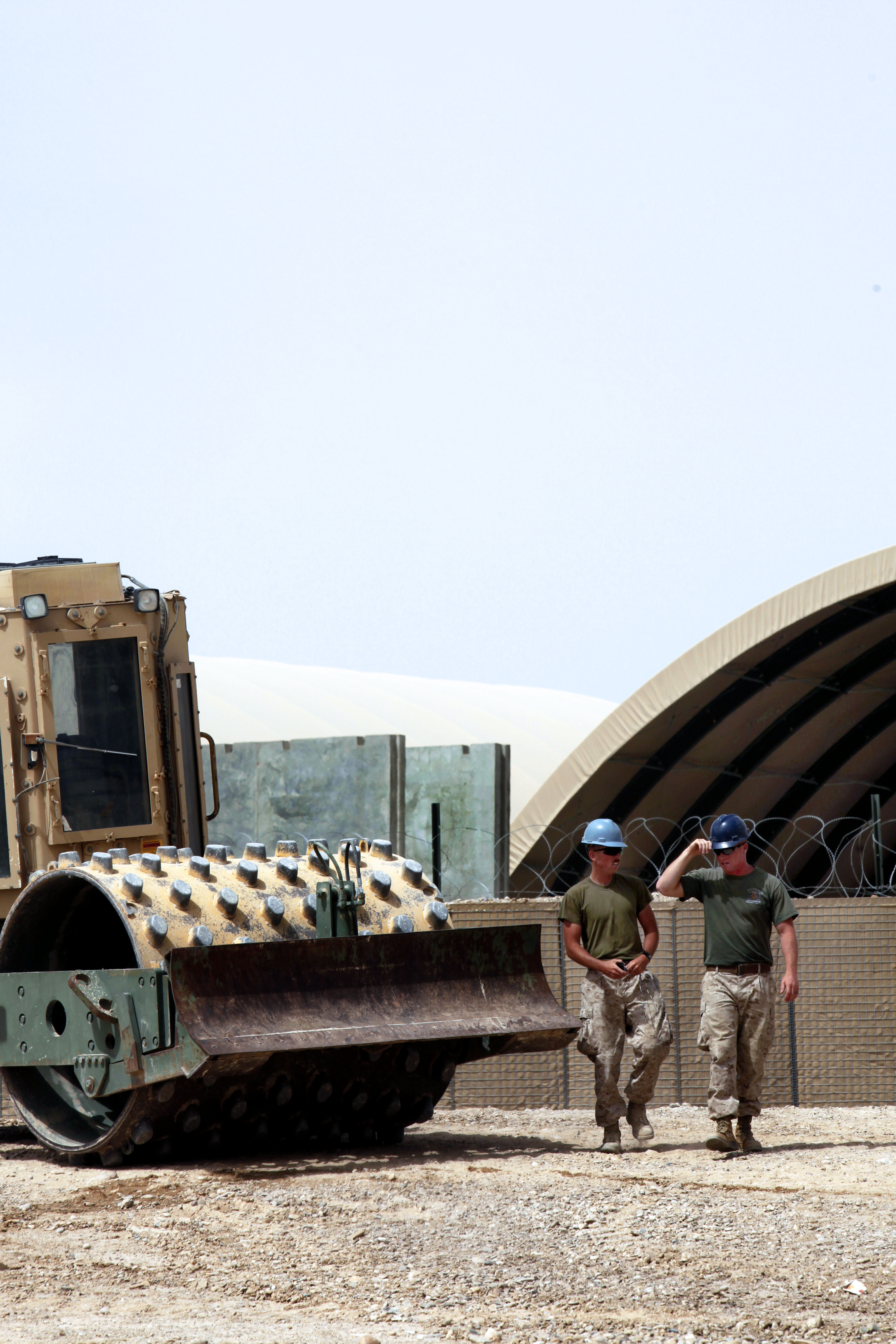 U.S. Marines Corps Lance Cpl. John M. Finegan, left, and U.S. Marine ...