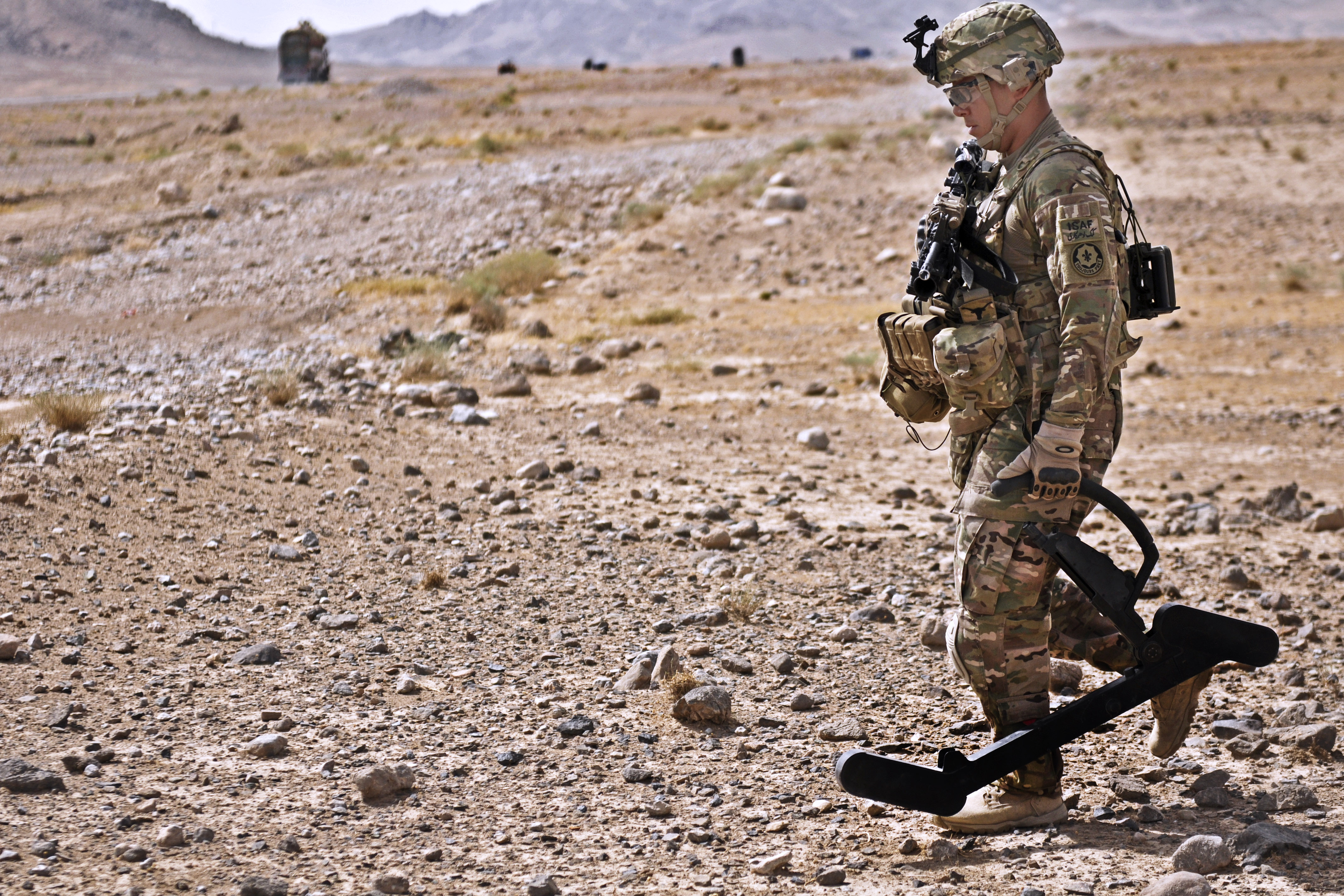 A U.S. soldier uses a lightweight, portable, handheld device called a ...