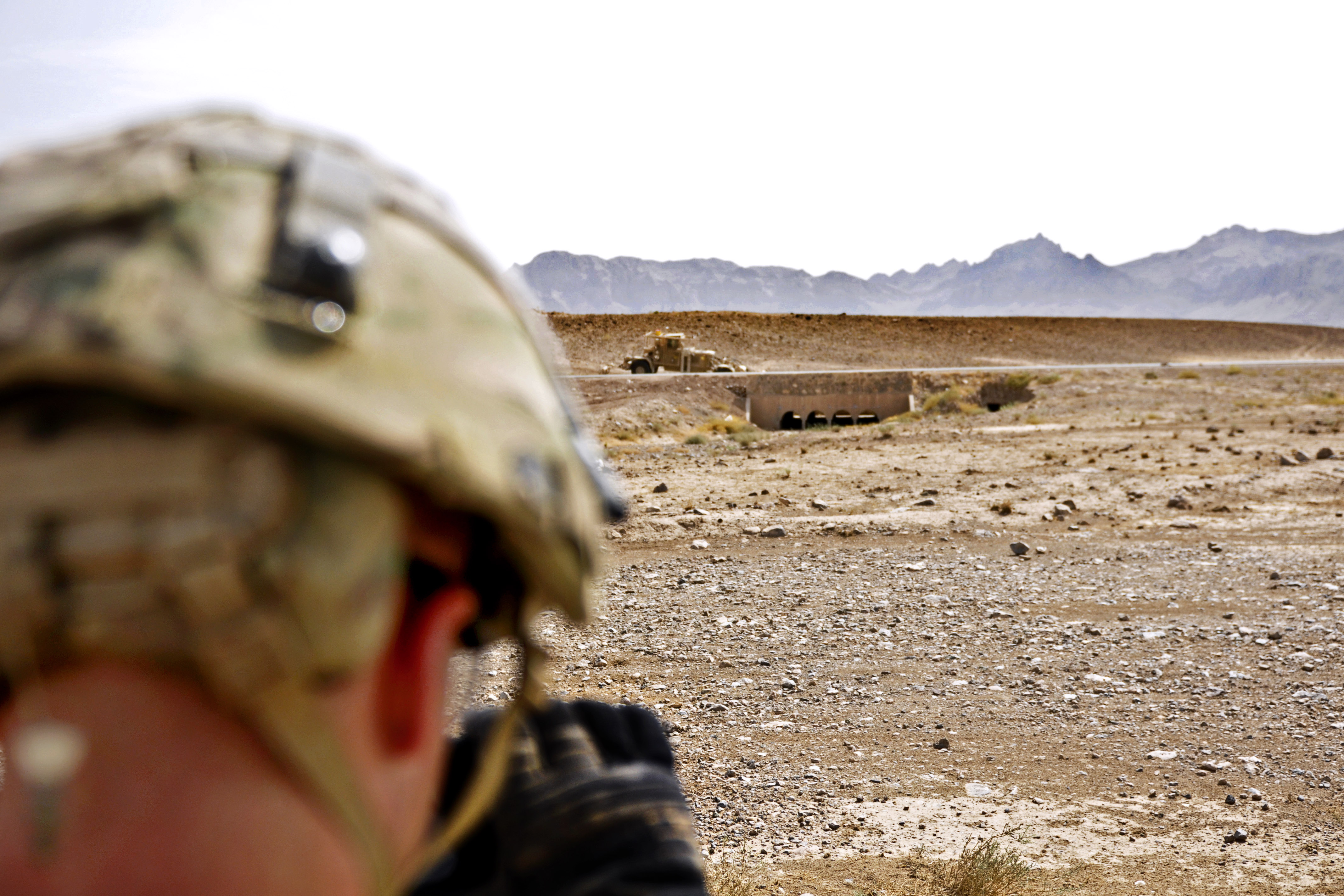 U.S. Army 2nd Lt. Doug Palmer takes a photo from a distance after ...