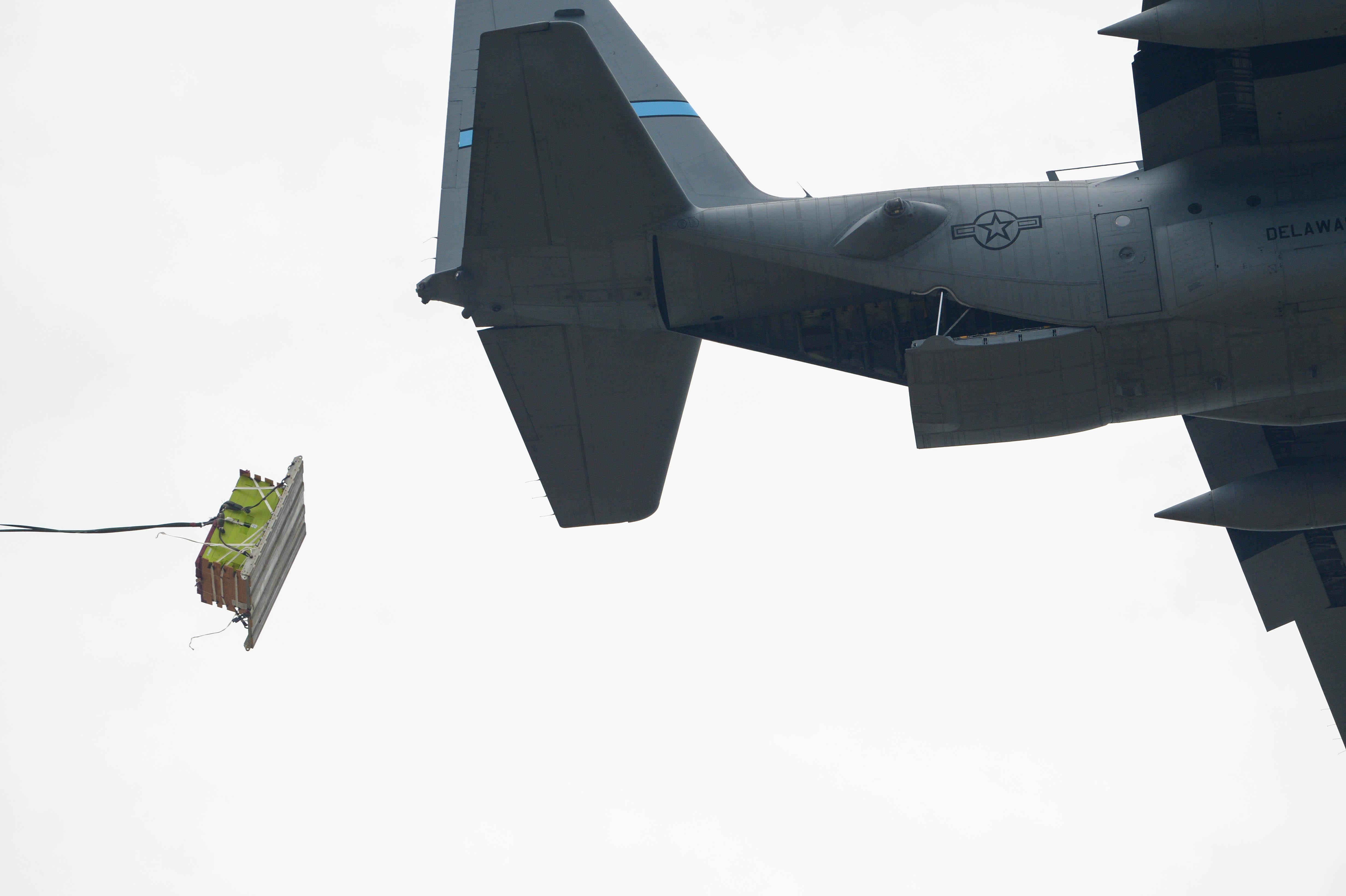 C-130 aircraft five ship formation and tactical airdrop
