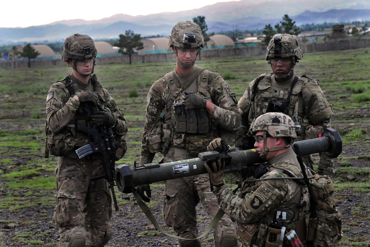 U.S. Army Staff Sgt. Daniel DeSaulniers, foreground, instructs soldiers ...