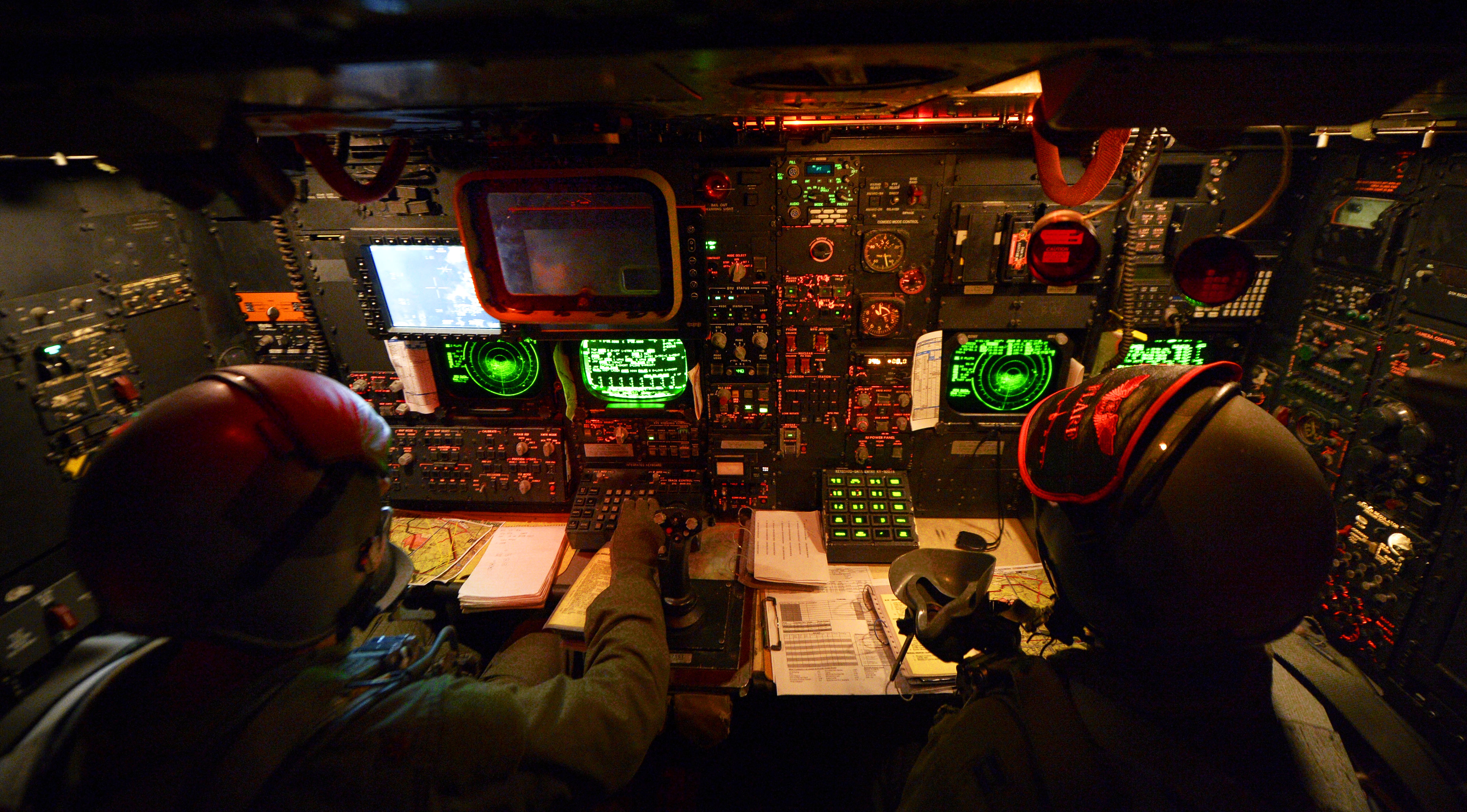 Air Force Maj. Chris Weir and Air Force Capt. Greg Lepper check the ...
