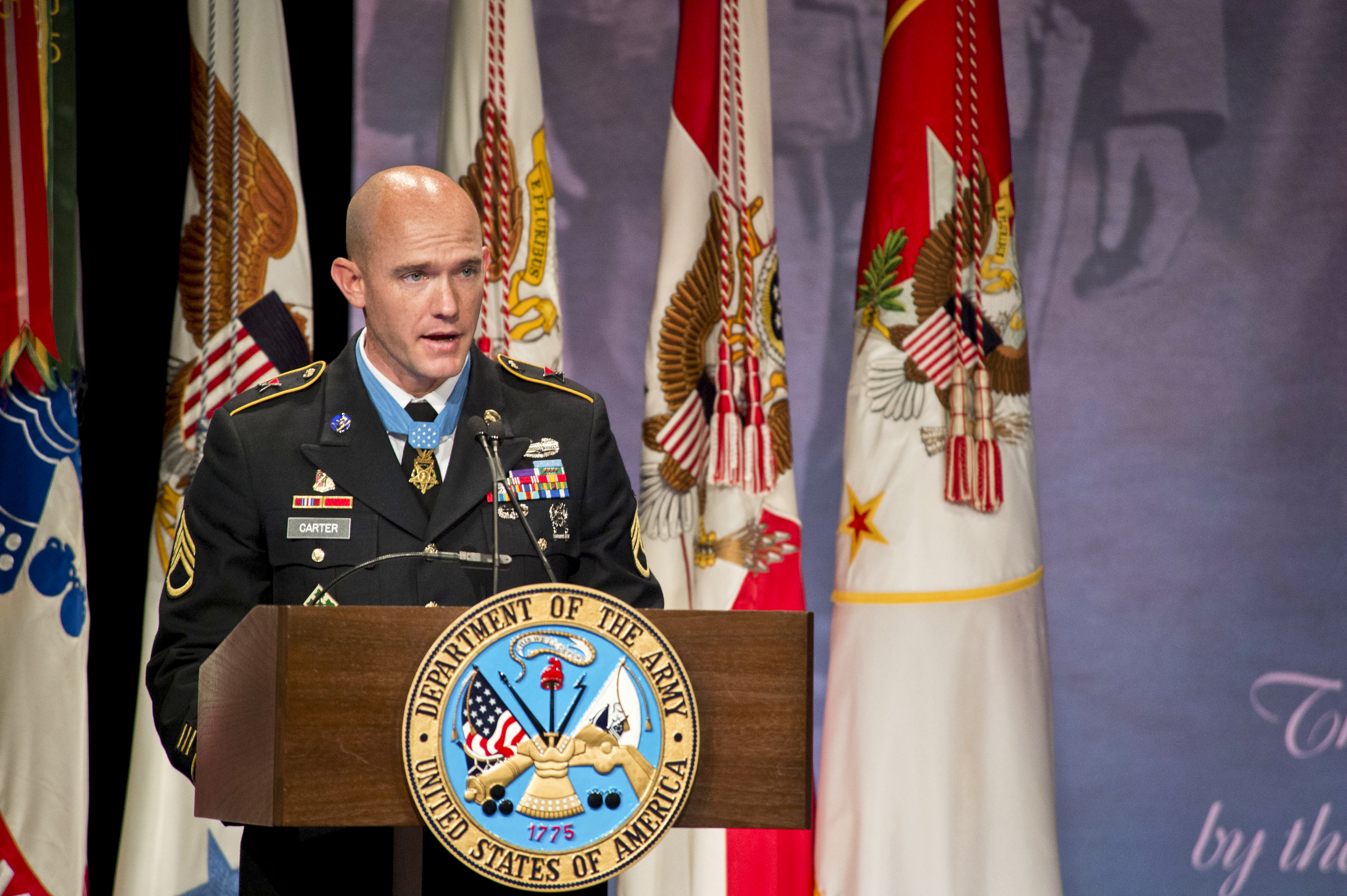 U.S. Army Staff Sgt. Ty Michael Carter speaks during a Medal of Honor ...