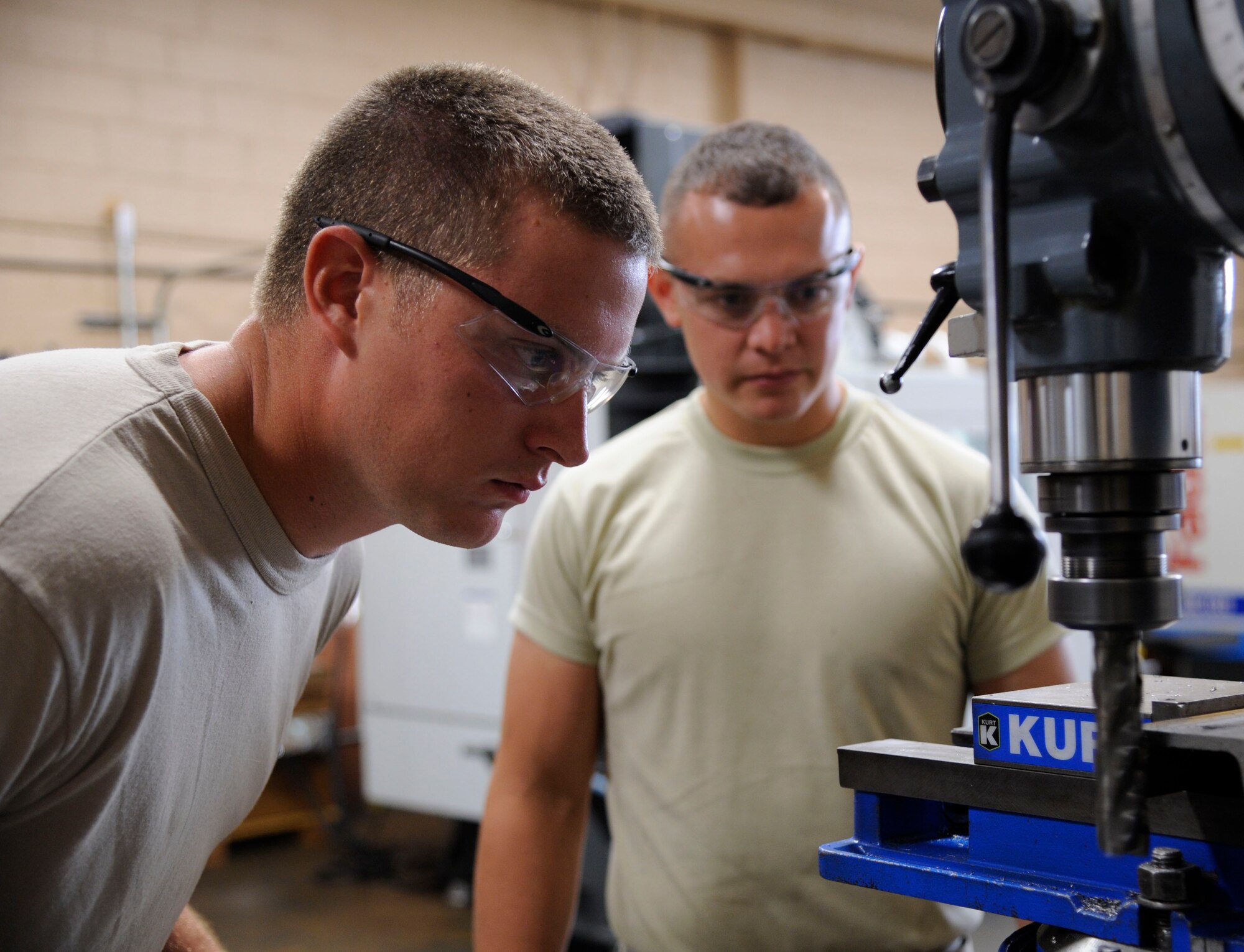 2nd MXS Fabrication flight Airmen cut, grind and bend metal for ...