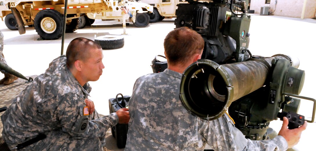 Paratroopers learn to how to load, arm and unload a BGM-71 TOW missile ...