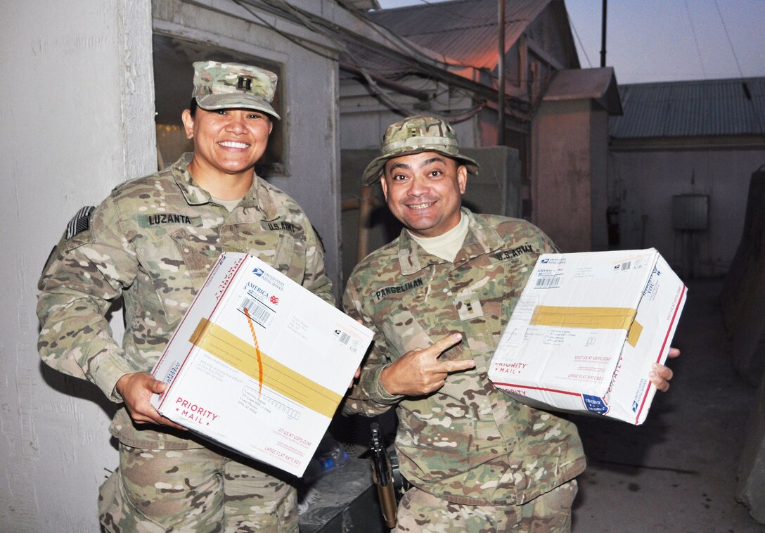 U.S. Army Capt. Venesia R. Luzanata, left, and Chief Warrant Officer ...