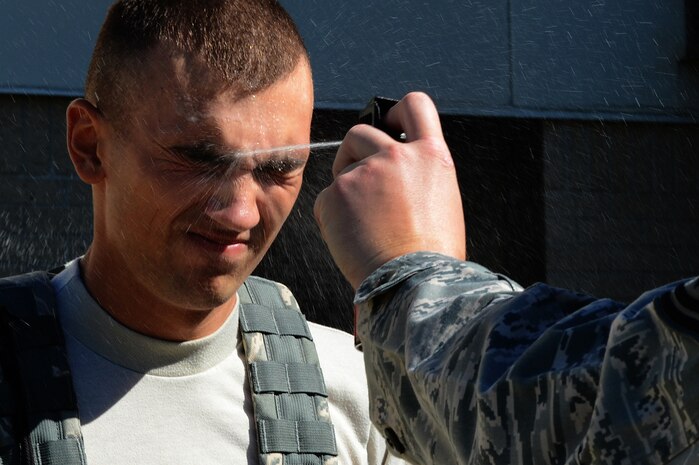 802nd Security Forces Squadron performs pepper spray training