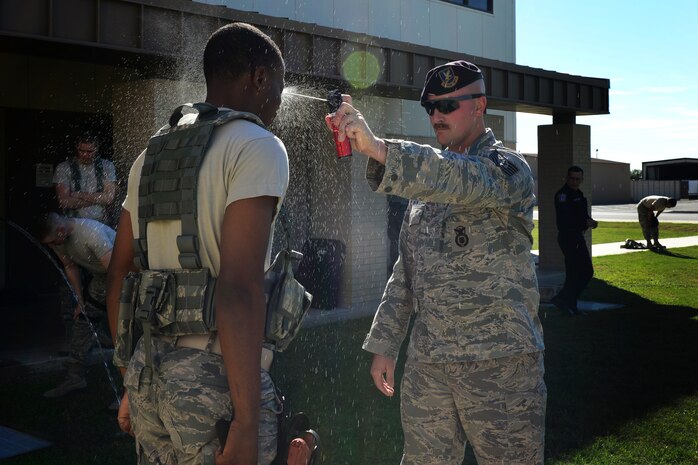 802nd Security Forces Squadron performs pepper spray training