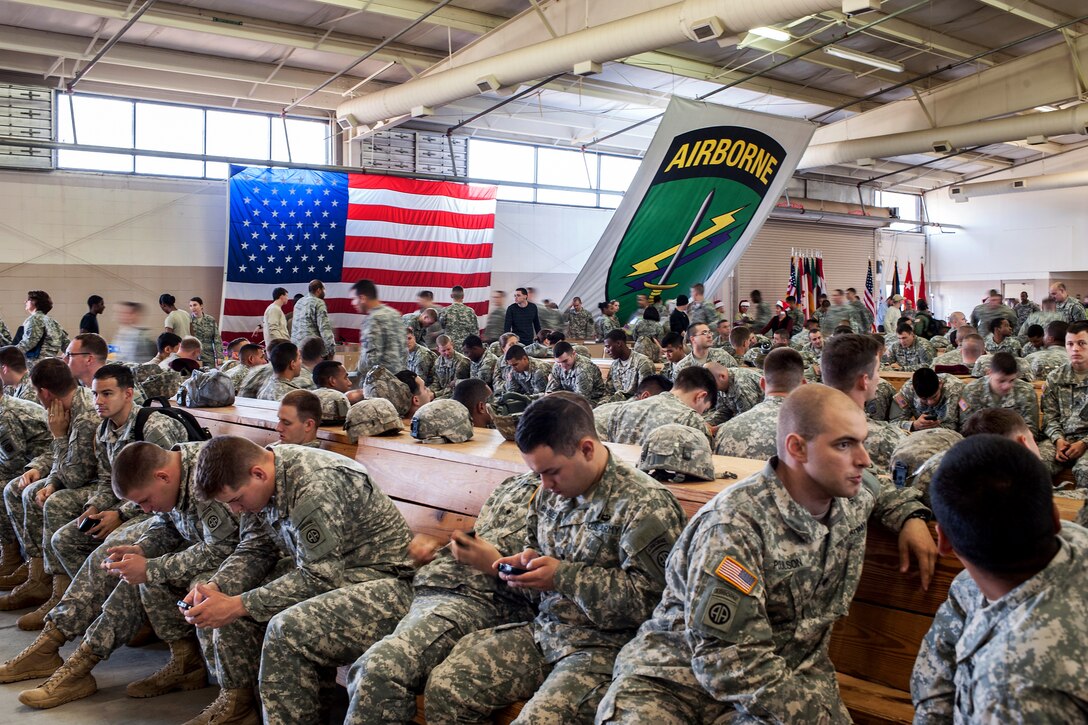 Paratroopers wait for their lottery numbers to be called during the ...