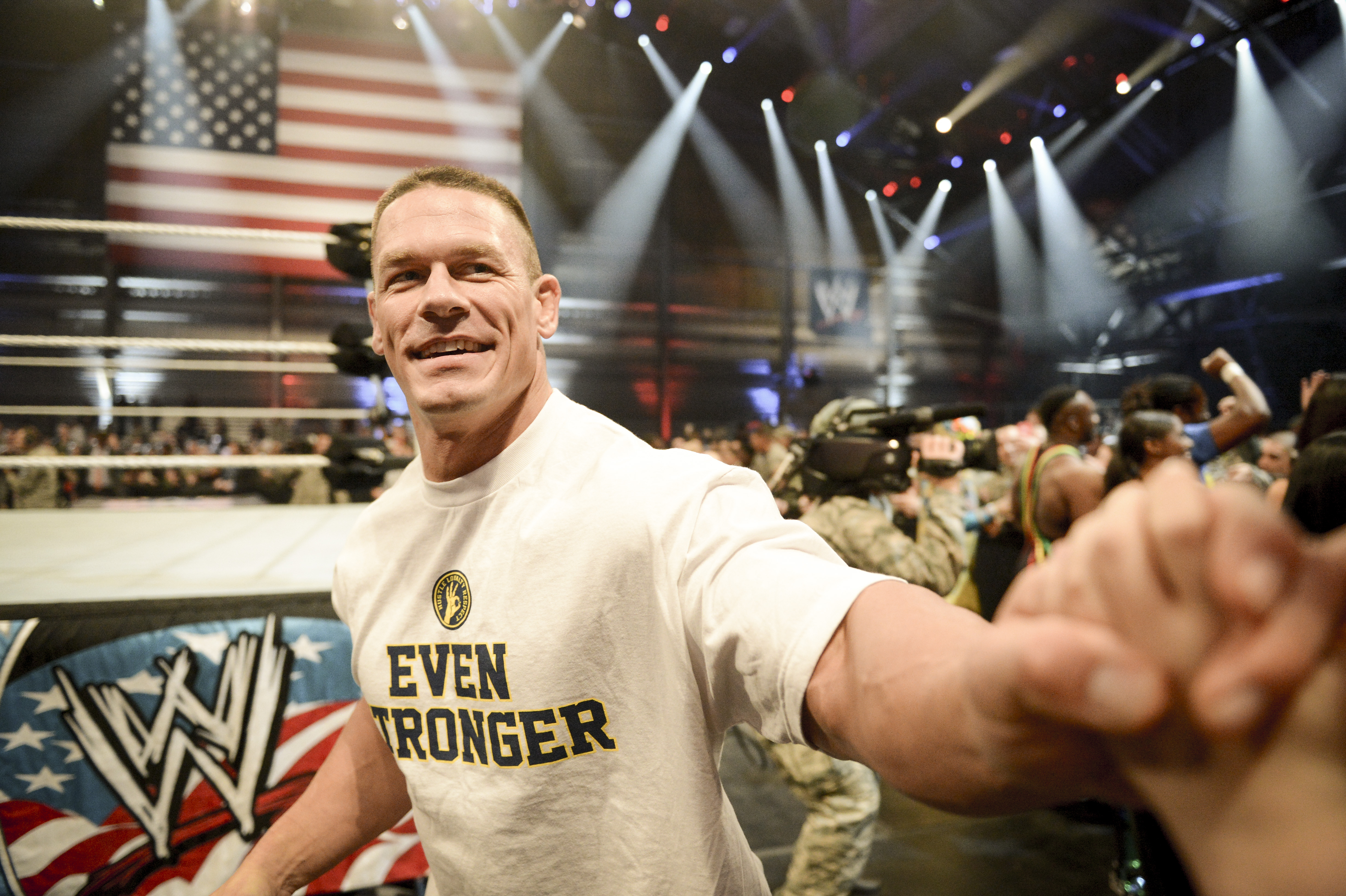 Punches, punchlines, rock & roll: WWE brings wrestling, comedy, music ...