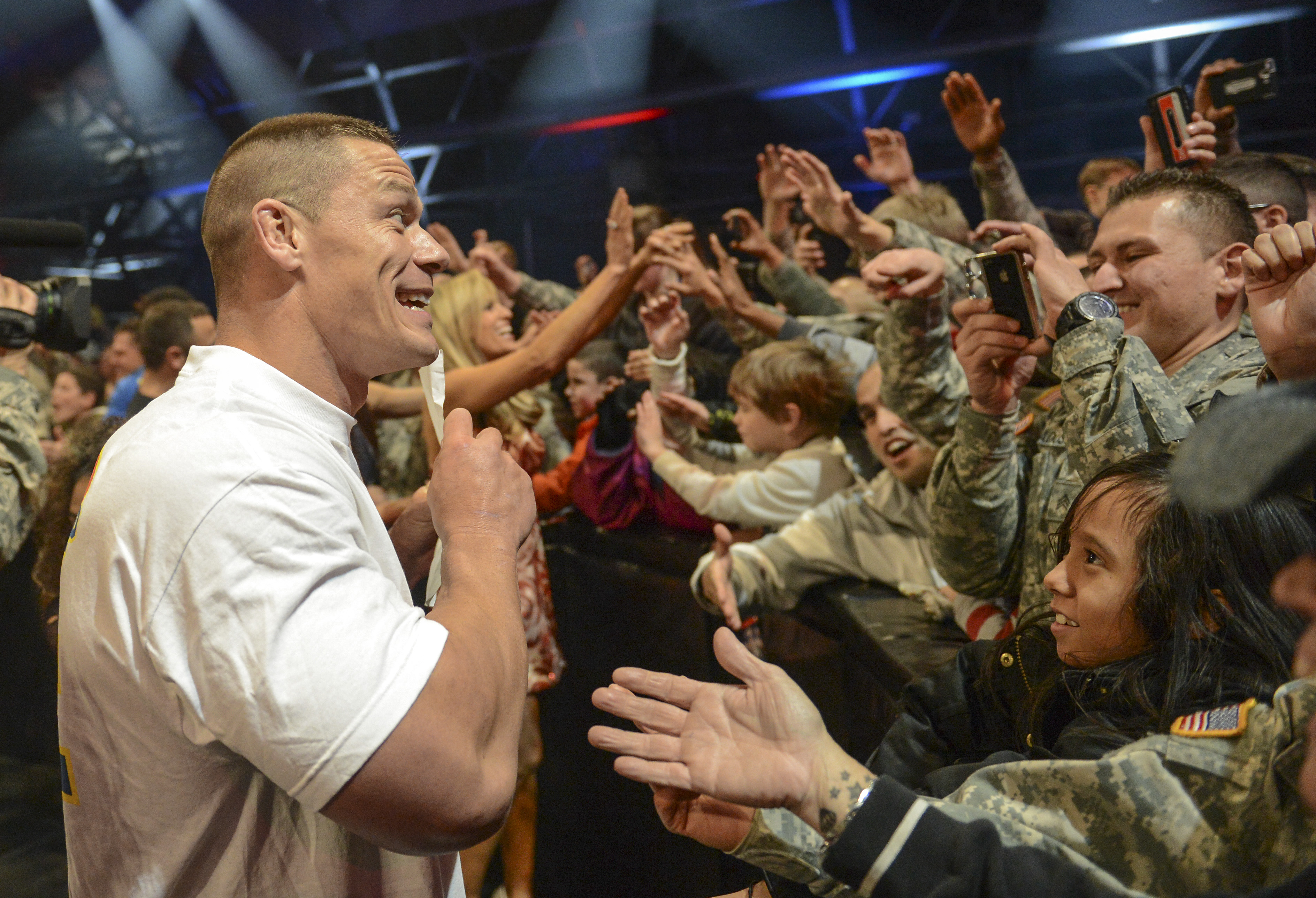 Punches, punchlines and rock & roll: WWE brings wrestling, comedy and ...