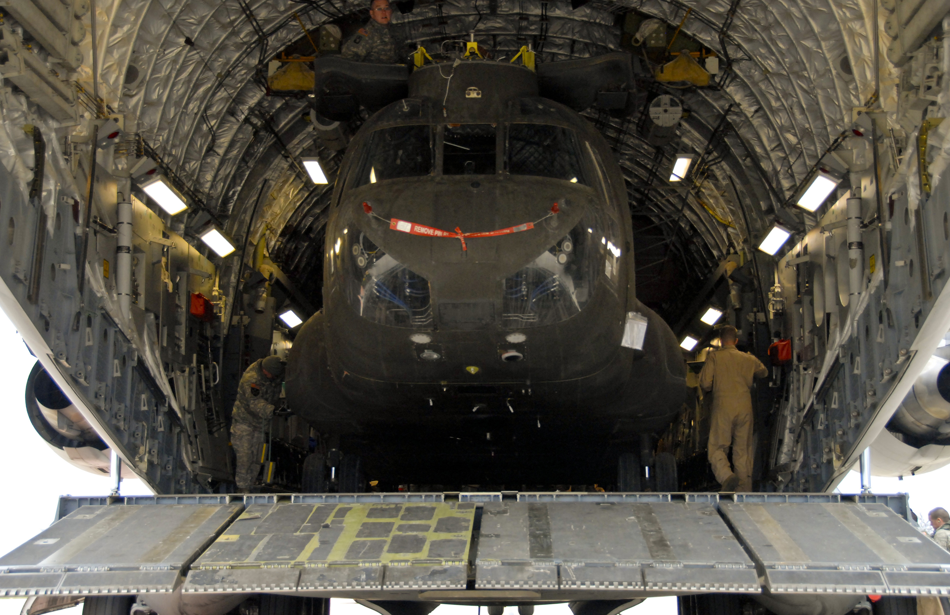 C-17 Globemaster III delivers CH-47 Chinook helicopter back from ...