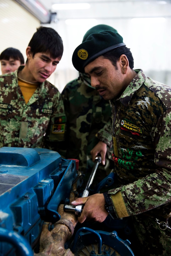 An Afghan soldier uses a torque wrench during training on Camp Shorabak ...