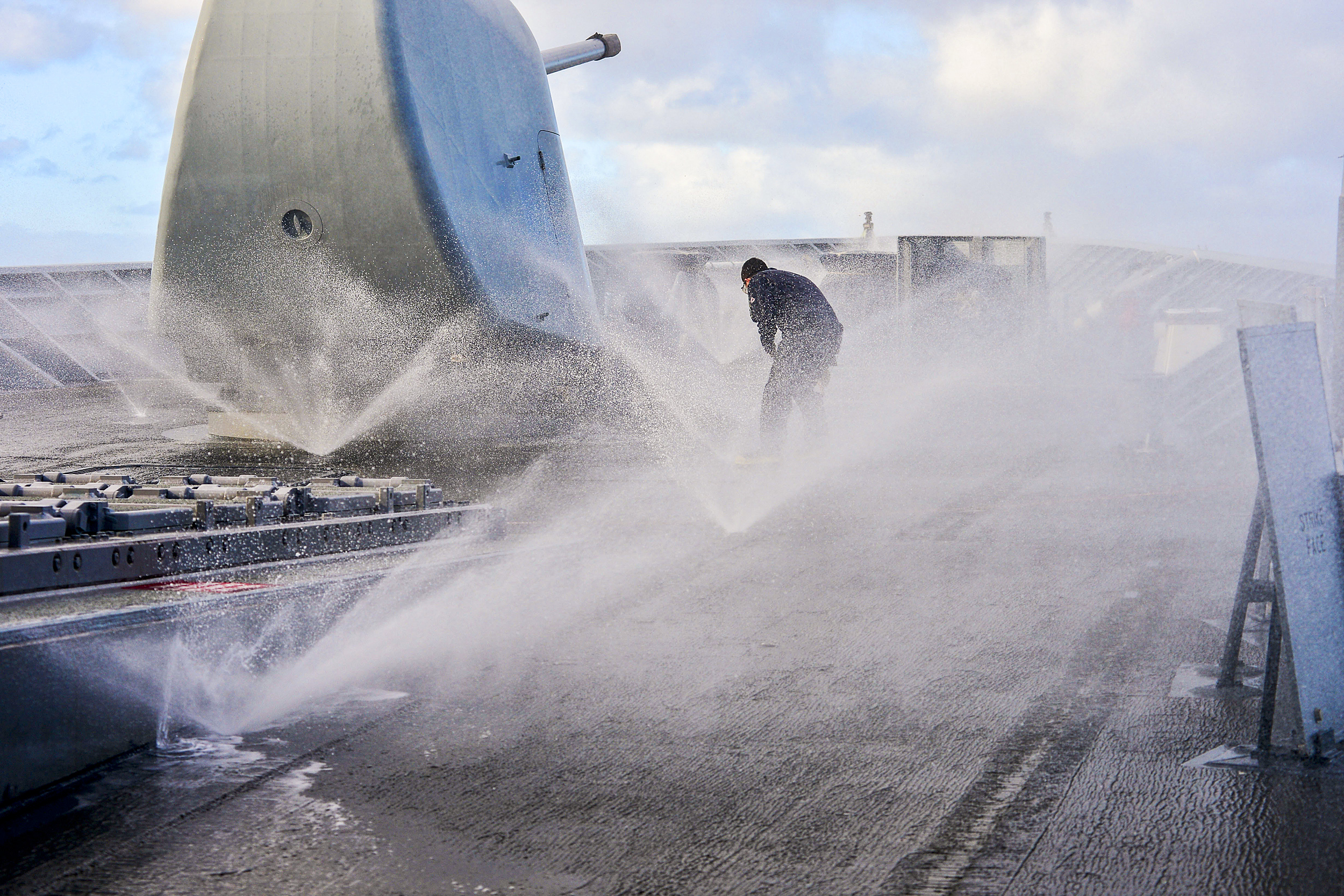U.S. Navy Petty Officer 2nd Class Cory Reed conducts a countermeasure ...