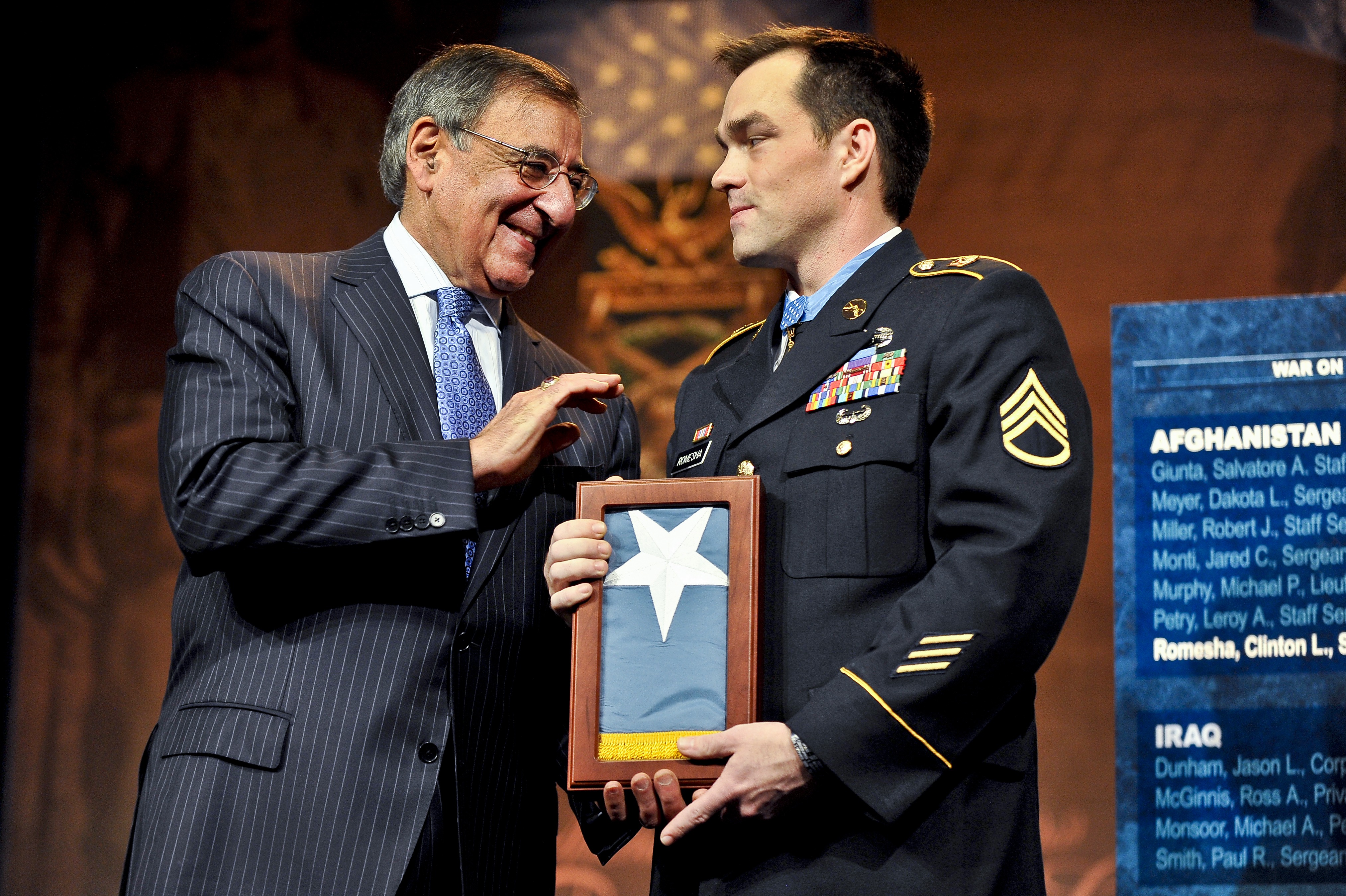 Defense Secretary Leon E. Panetta presents former Army Staff Sgt ...