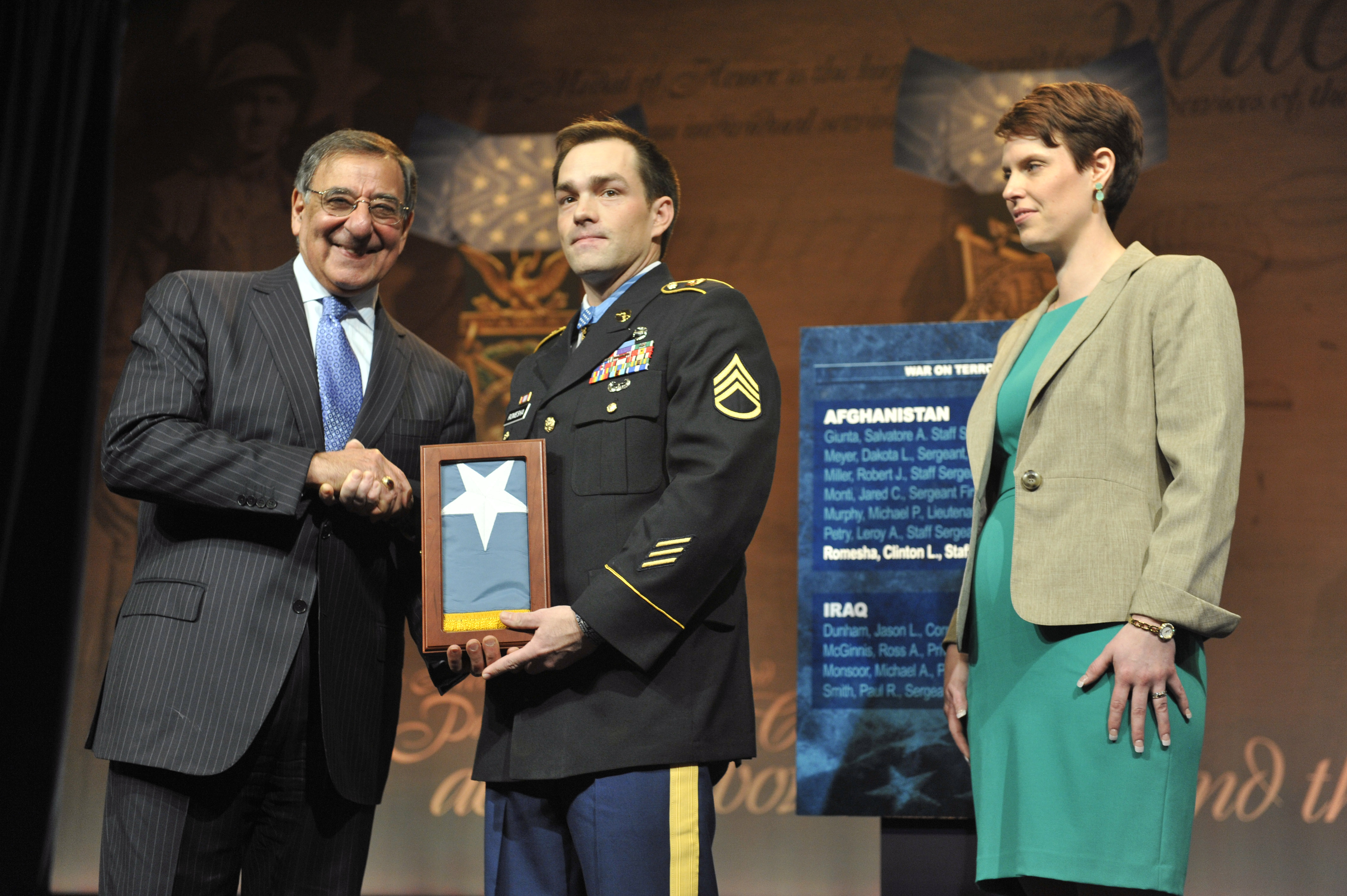Defense Secretary Leon E. Panetta presents former Army Staff Sgt ...
