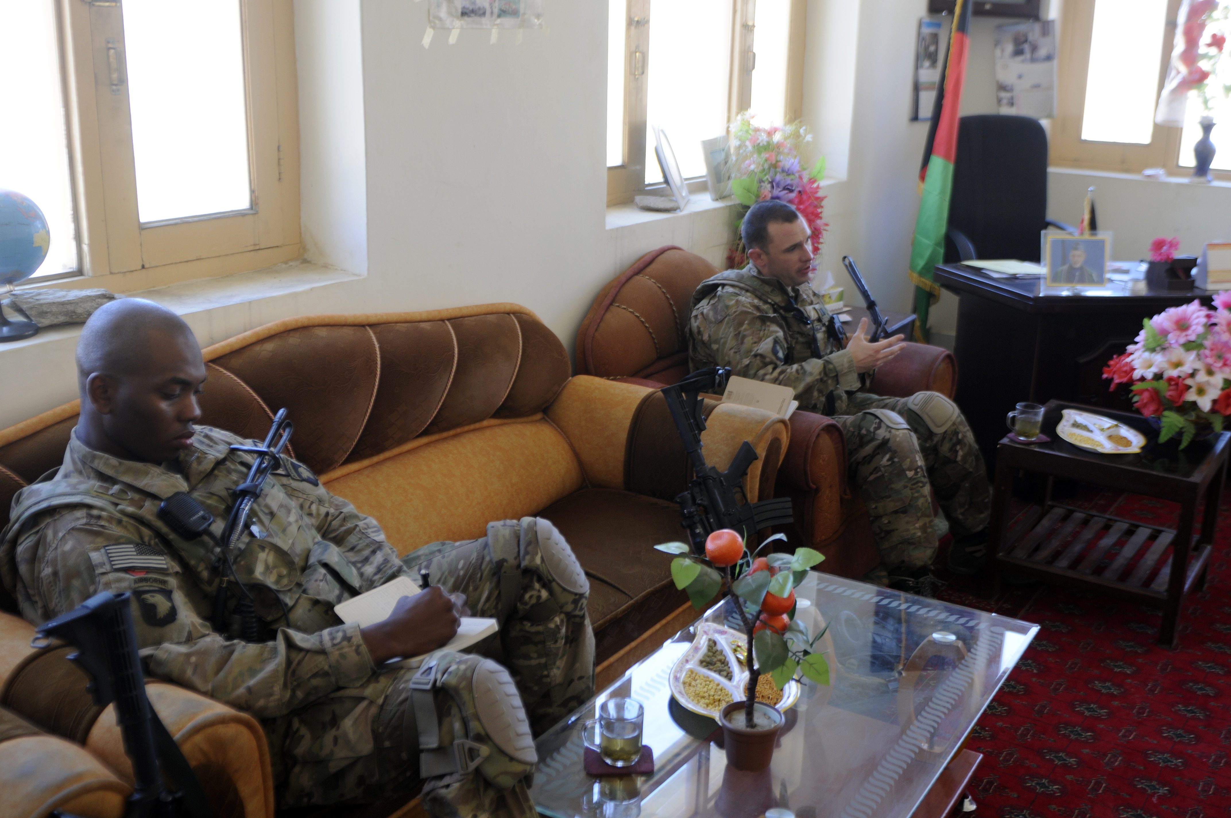 U.S. Army Capt. Timothy Walton, right, and U.S. Army Pfc. Gimbala ...