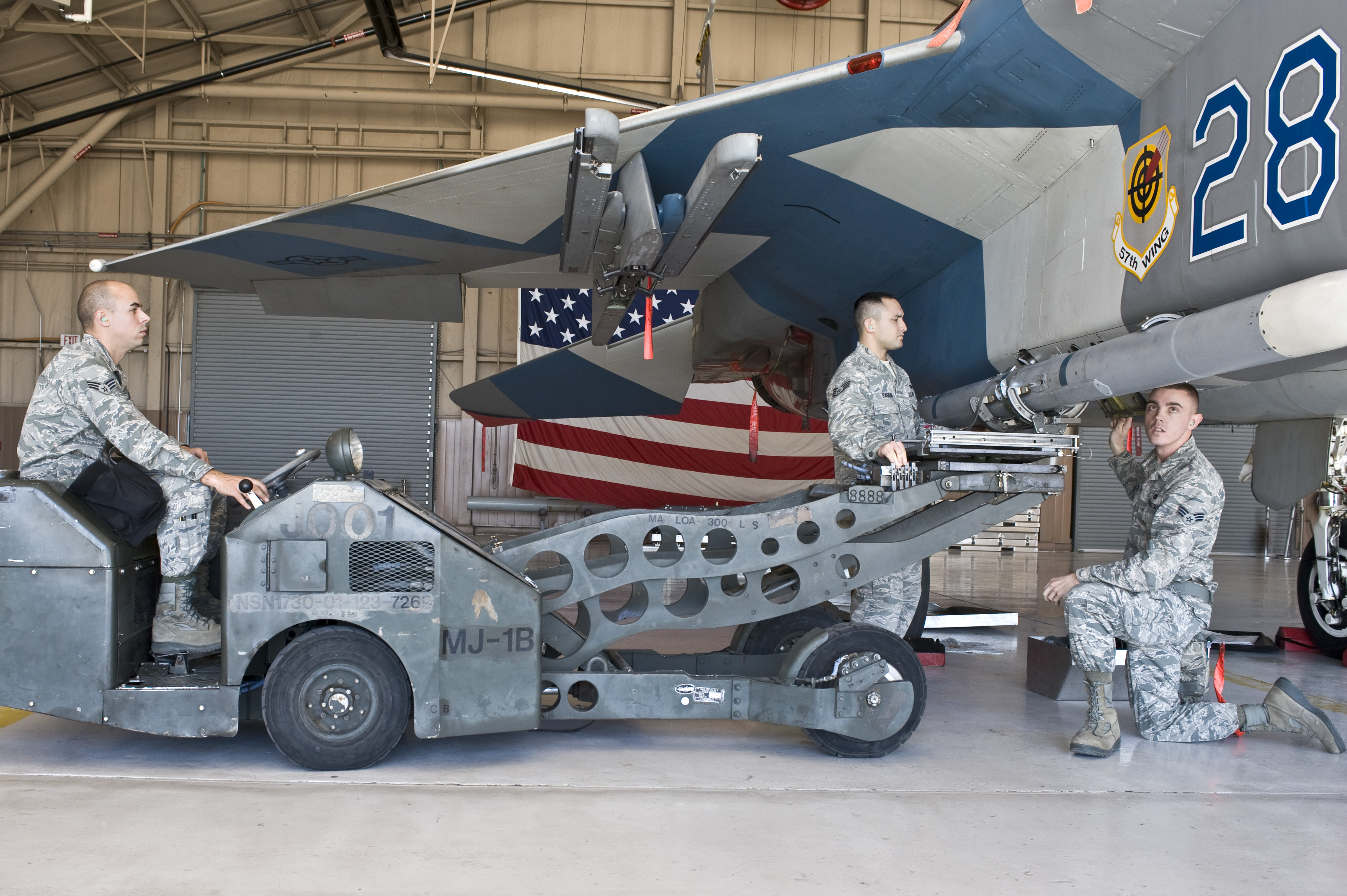 Another day at the office; weapons load crew keep aircraft armed ...