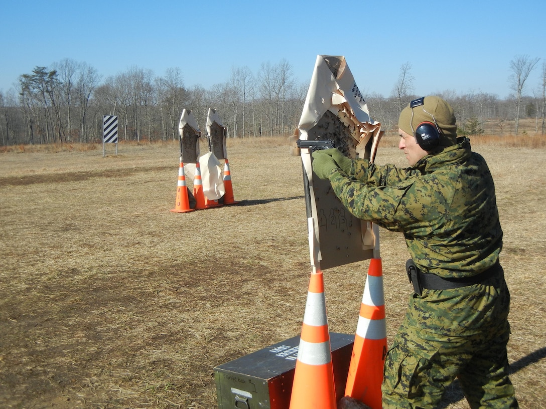 Band swaps percussion, piccolos for pistols, police training
