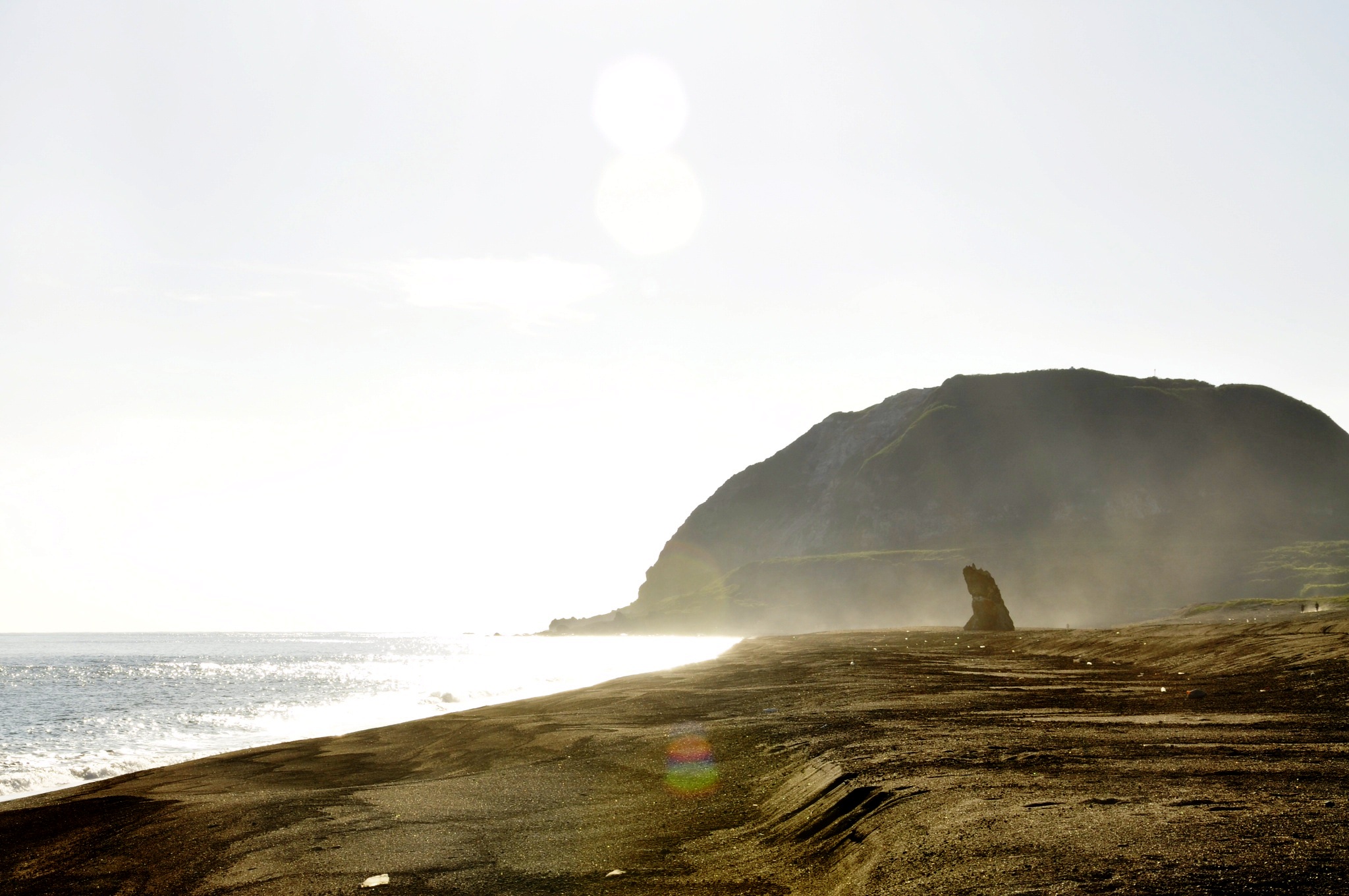 Mount Suribachi stands in tall in the distance