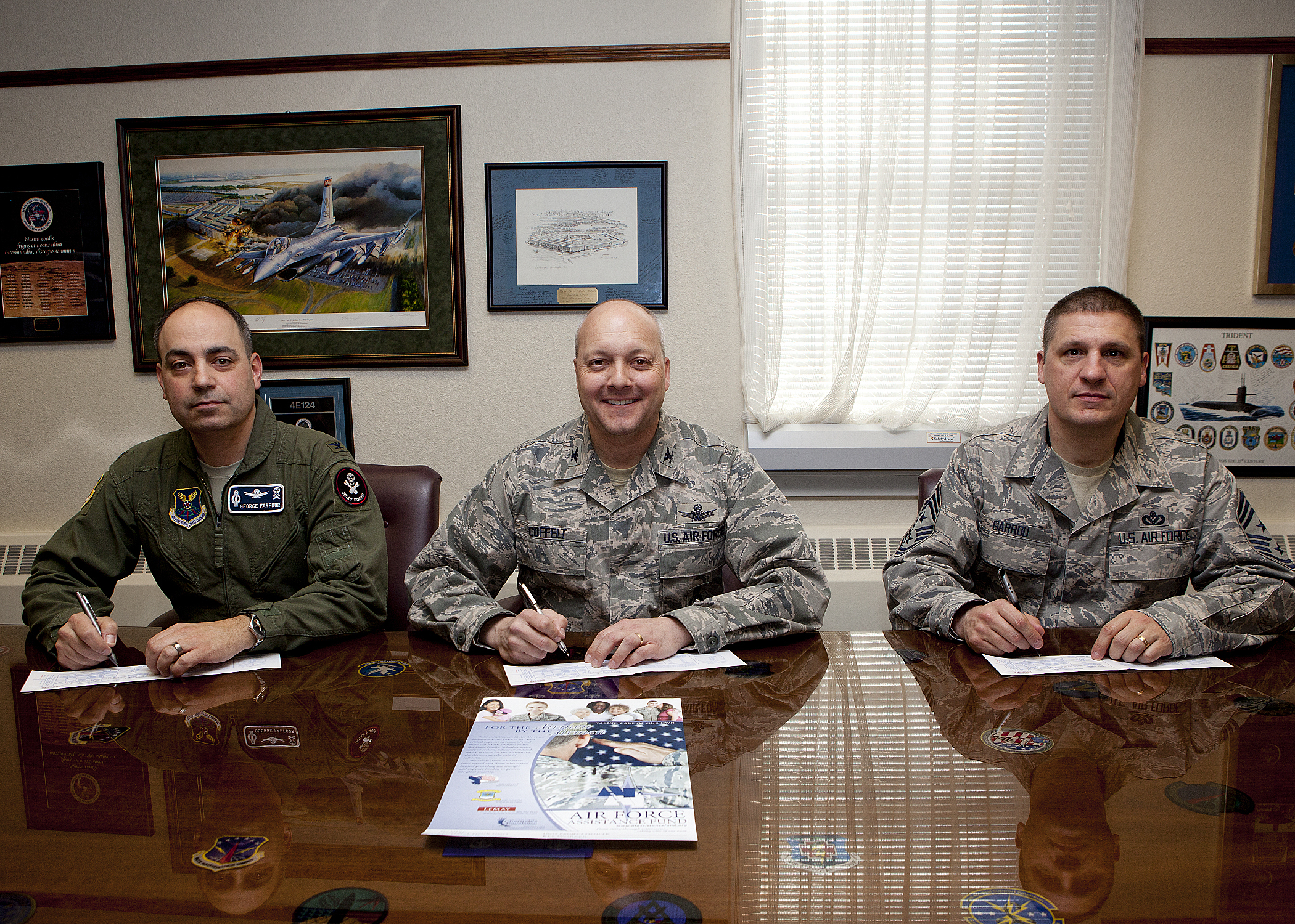 Mighty Ninety leadership contributes to Air Force Assistance Fund > F.E ...