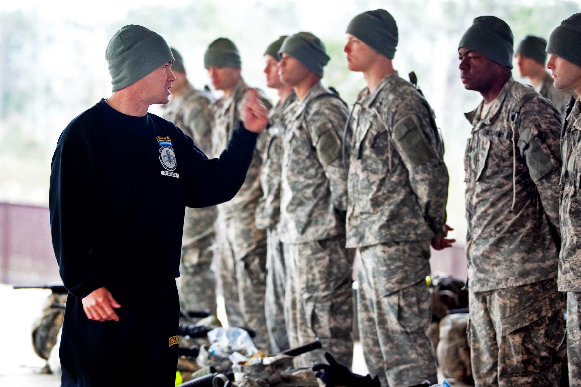 Army Capt. Gary Dettloff reprimands soldiers for a lack of respect to ...