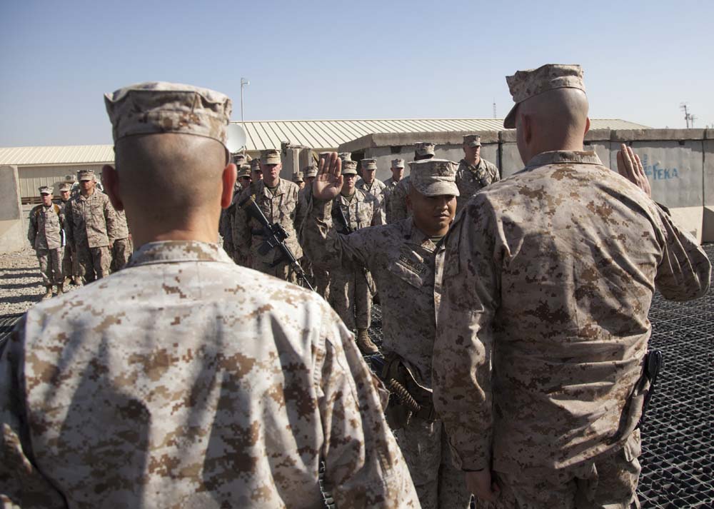 RCT-7 HQ Company Promotes Four and Reenlists One