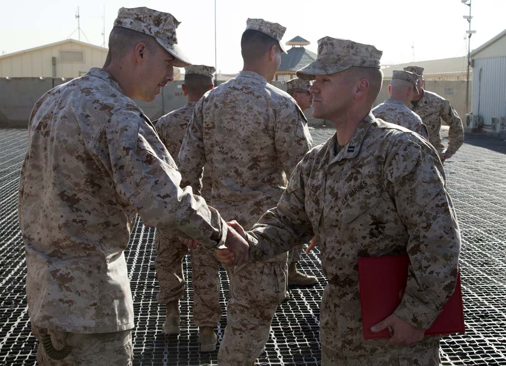 RCT-7 HQ Company Promotes Four and Reenlists One