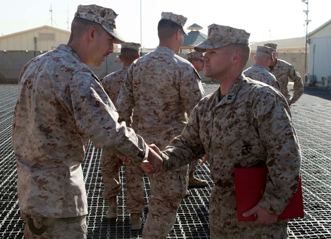 RCT-7 HQ Company Promotes Four and Reenlists One