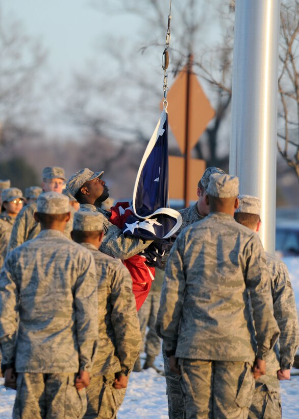 NASIC honors the flag for retreat ceremony