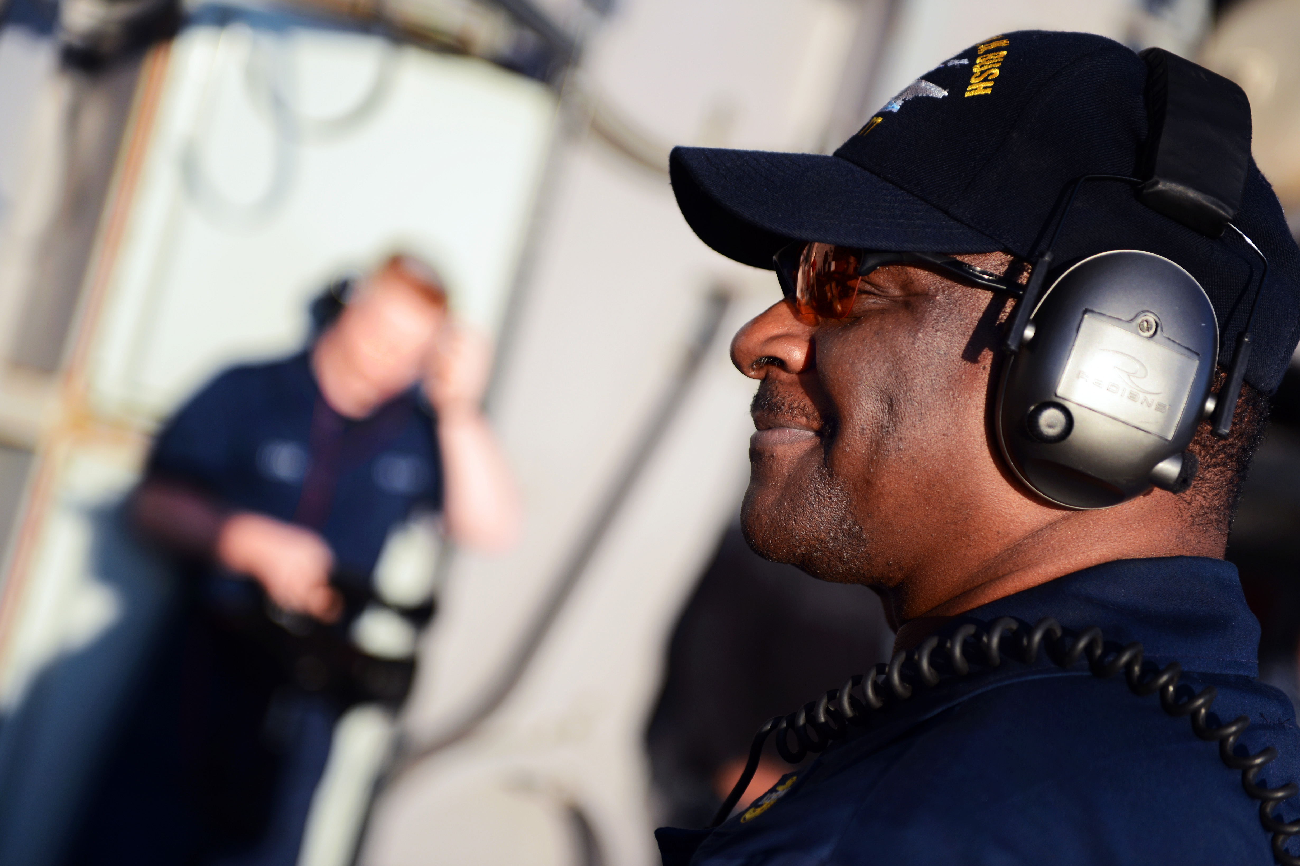 U.S. Navy Chief Remon Peterson supervises a live-fire training exercise ...