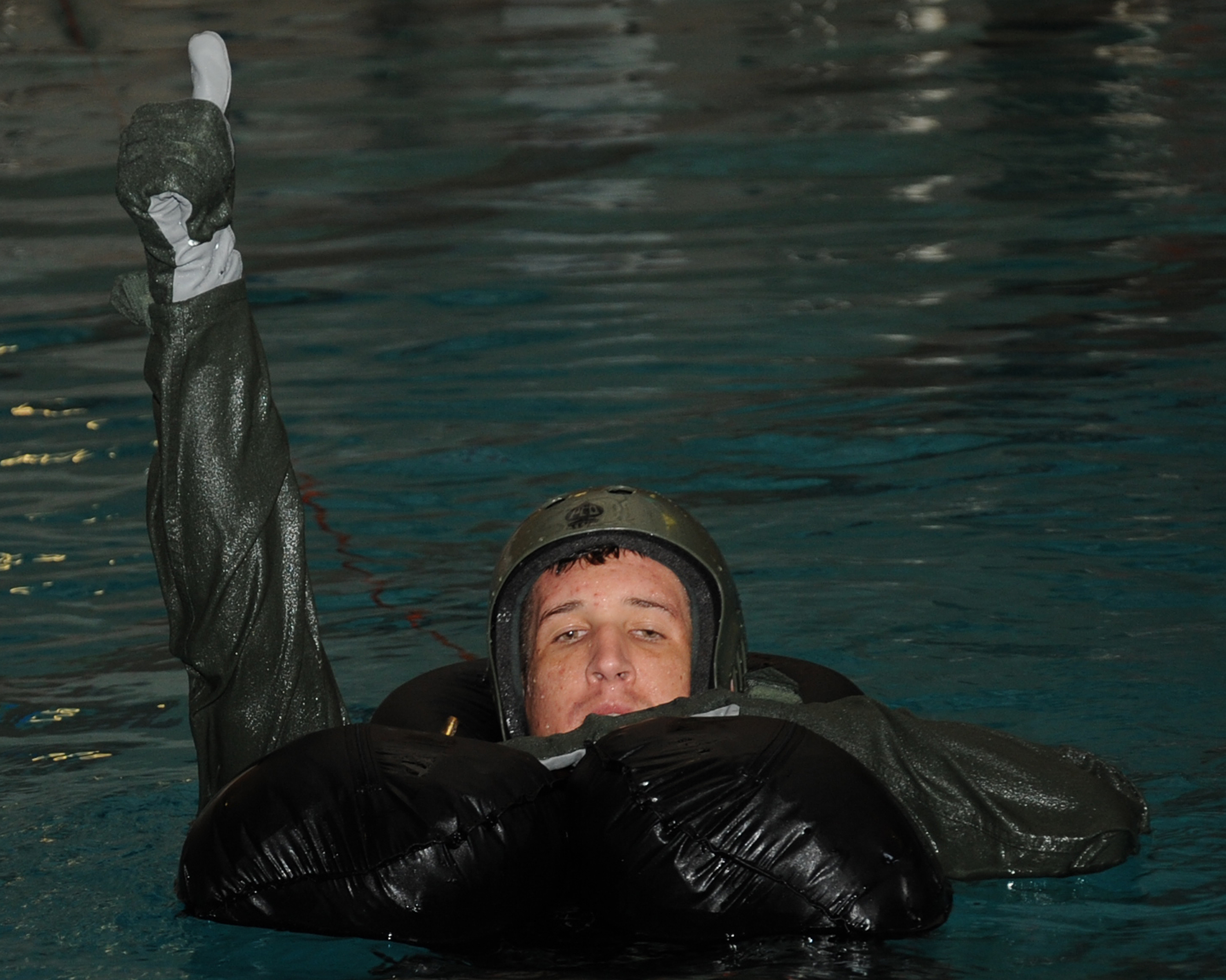 Aircrew dive into water survival training > Air Force Global Strike ...