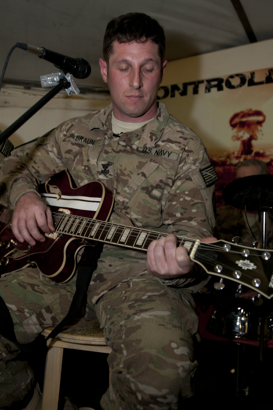 Navy Petty Officer 1st Class Michael Braun, lead singer for Controlled ...