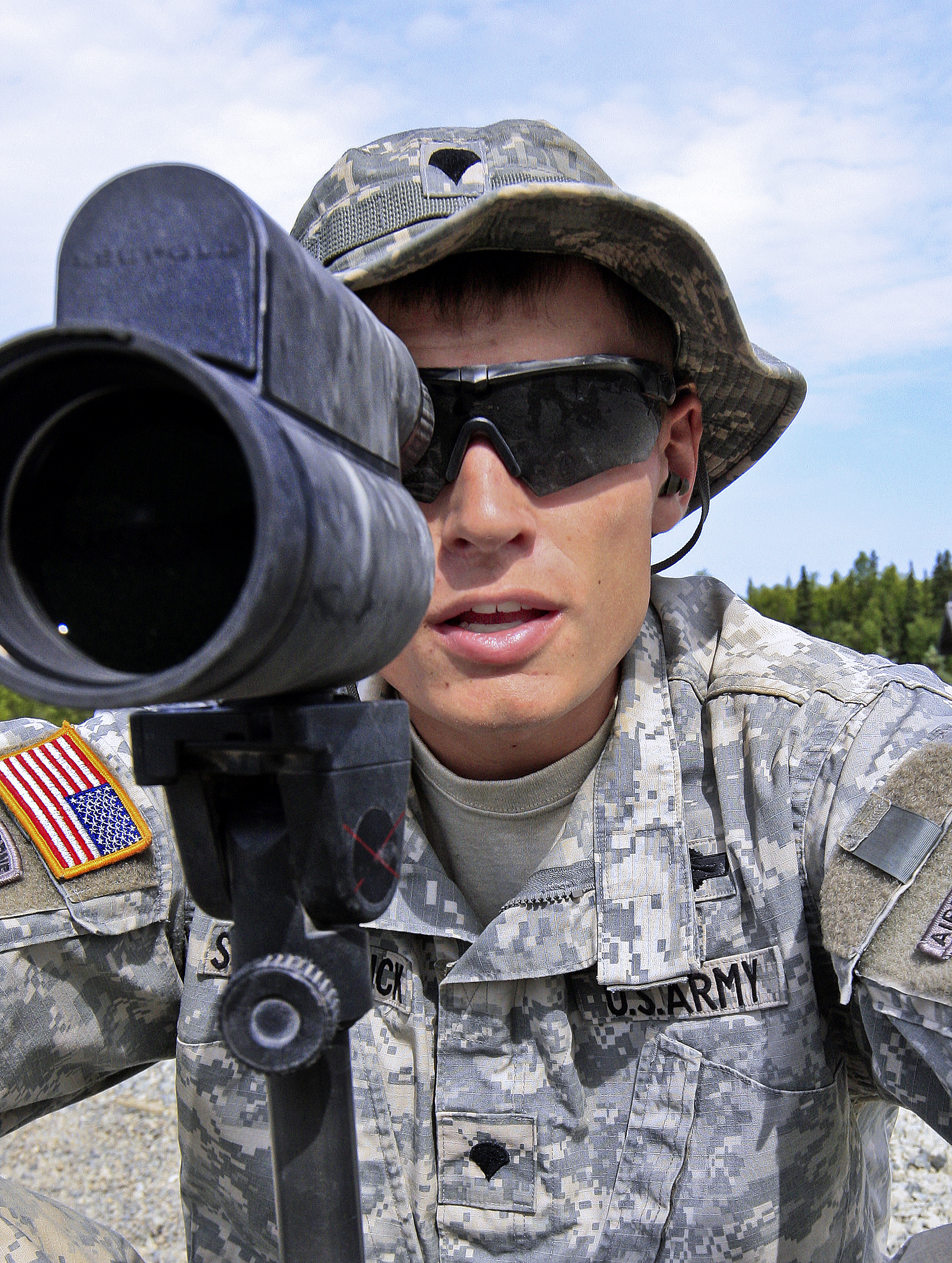 Army Spc. Noah Southwick spots for his shooter during the M110 semi ...