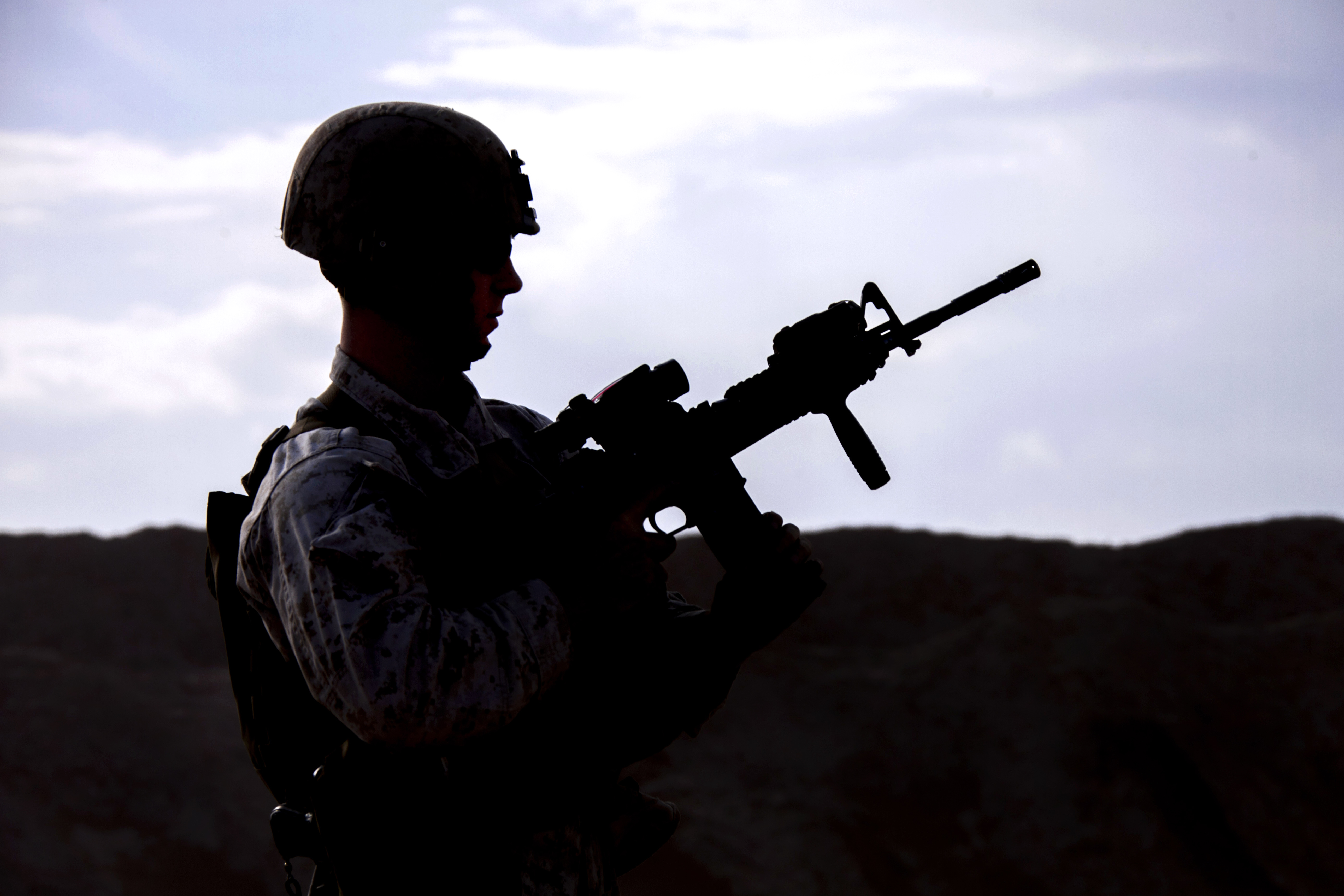 U.S. Marine Corps Cpl. Joseph Robinson prepares to engage his target ...
