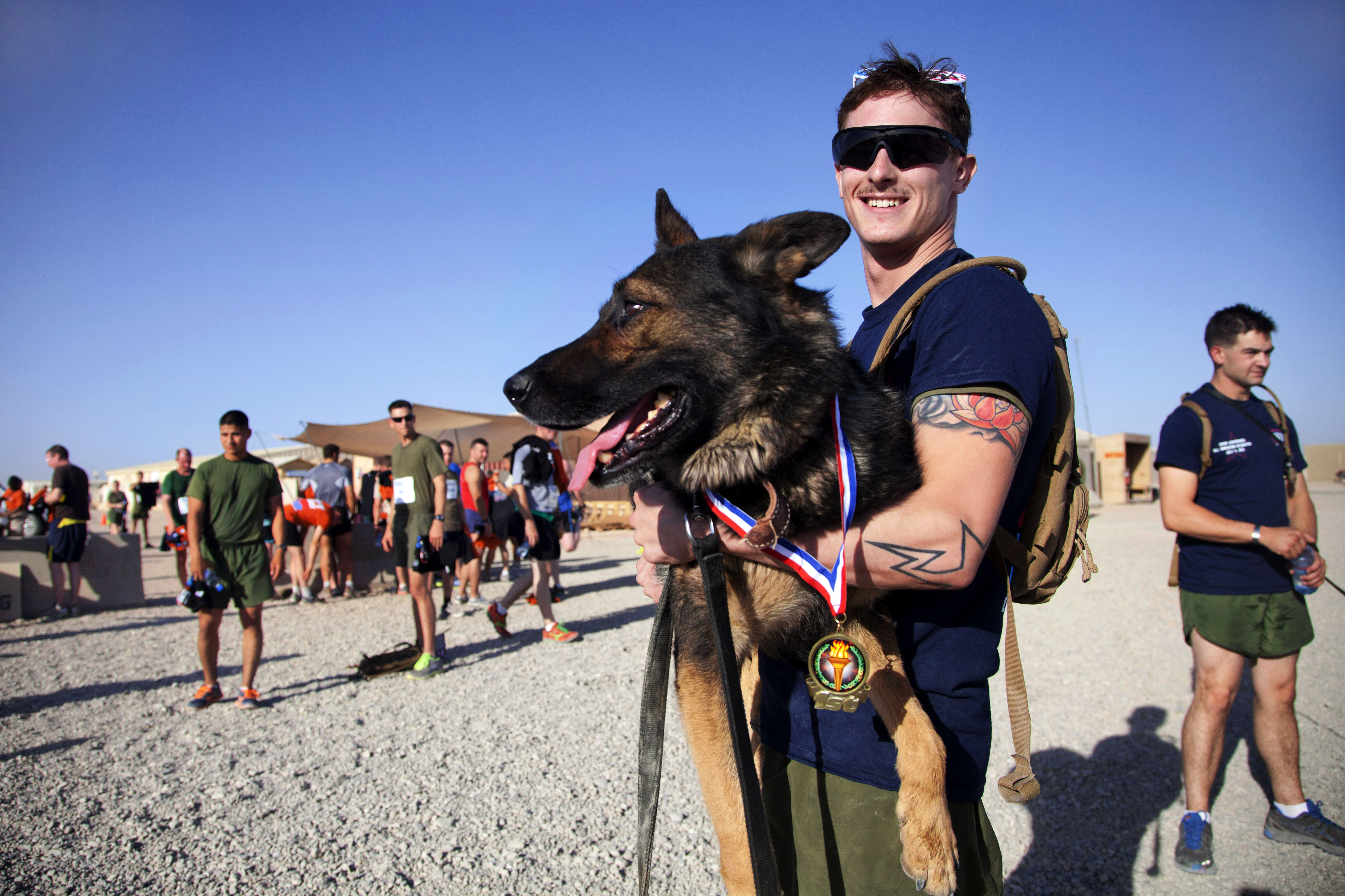 U.S. Marine Corps Cpl. Quinton F. McCloud pauses for a photograph with ...