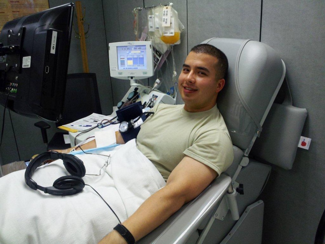 Army Pfc. Antony Redmon of Company C, 447th Signal Battalion, completes ...