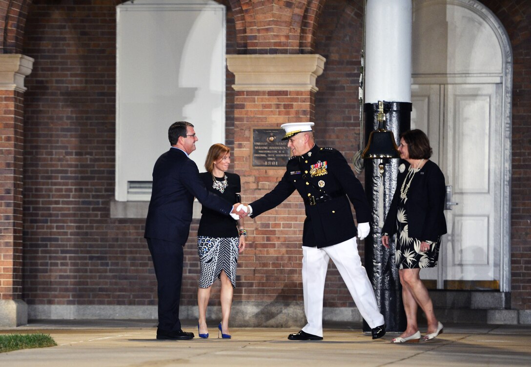 Deputy Defense Secretary Ash Carter shakes hands with Marine Corps Gen ...