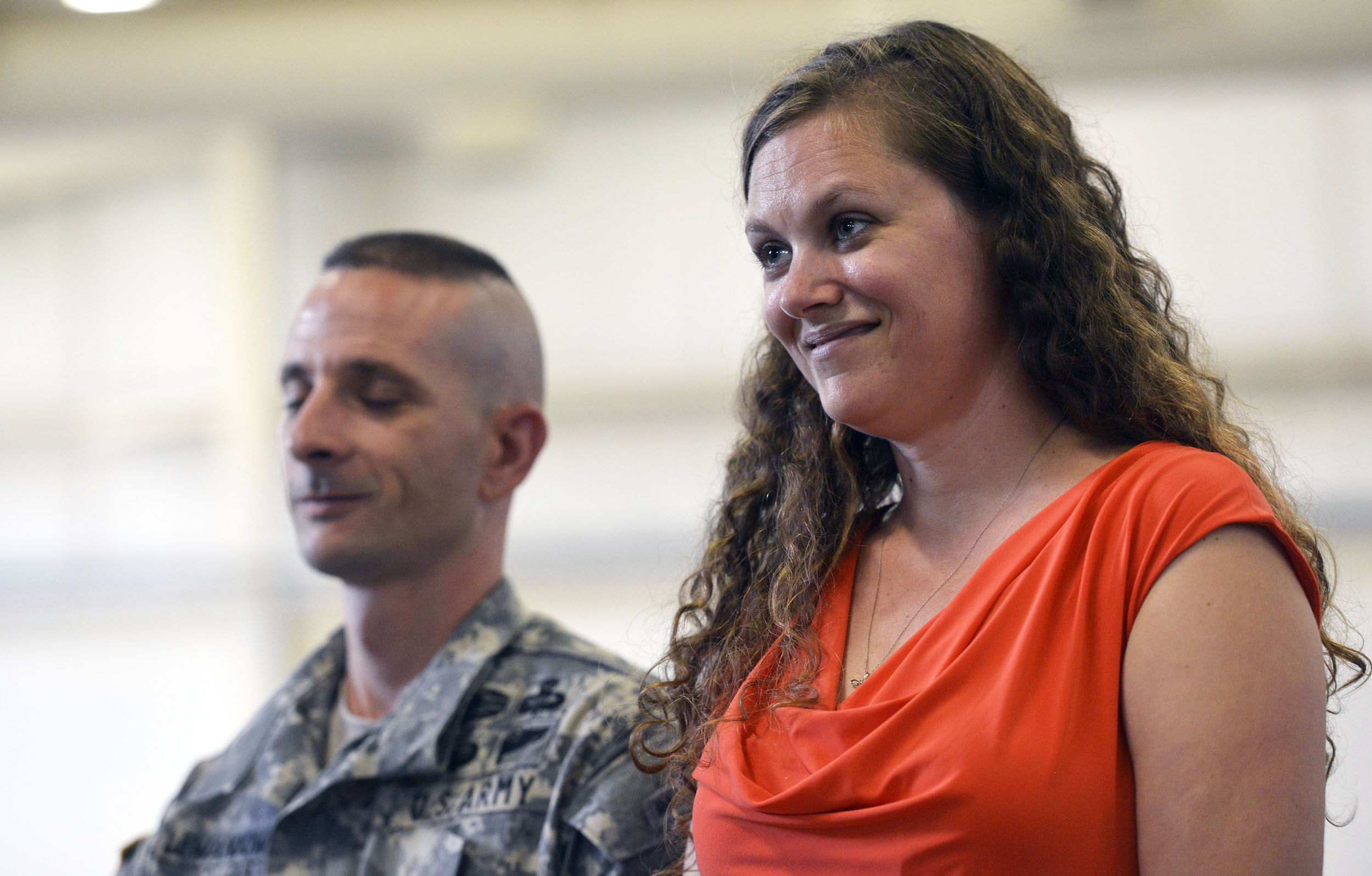 Melissa Lewandowski smiles as she, her husband, Army 1st Sgt. Evan ...