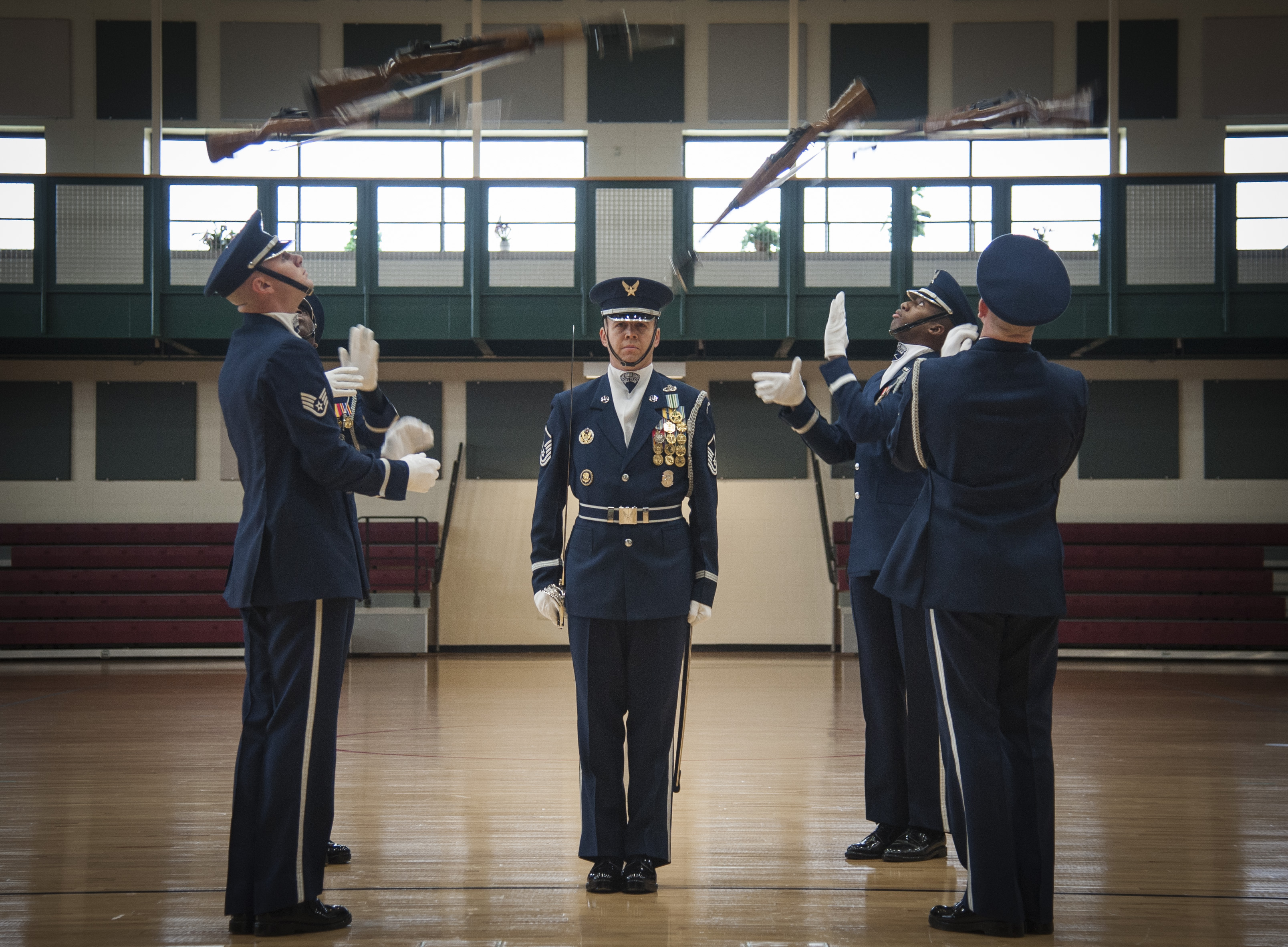 USAF Honor Guard drill team performs to cheering crowds