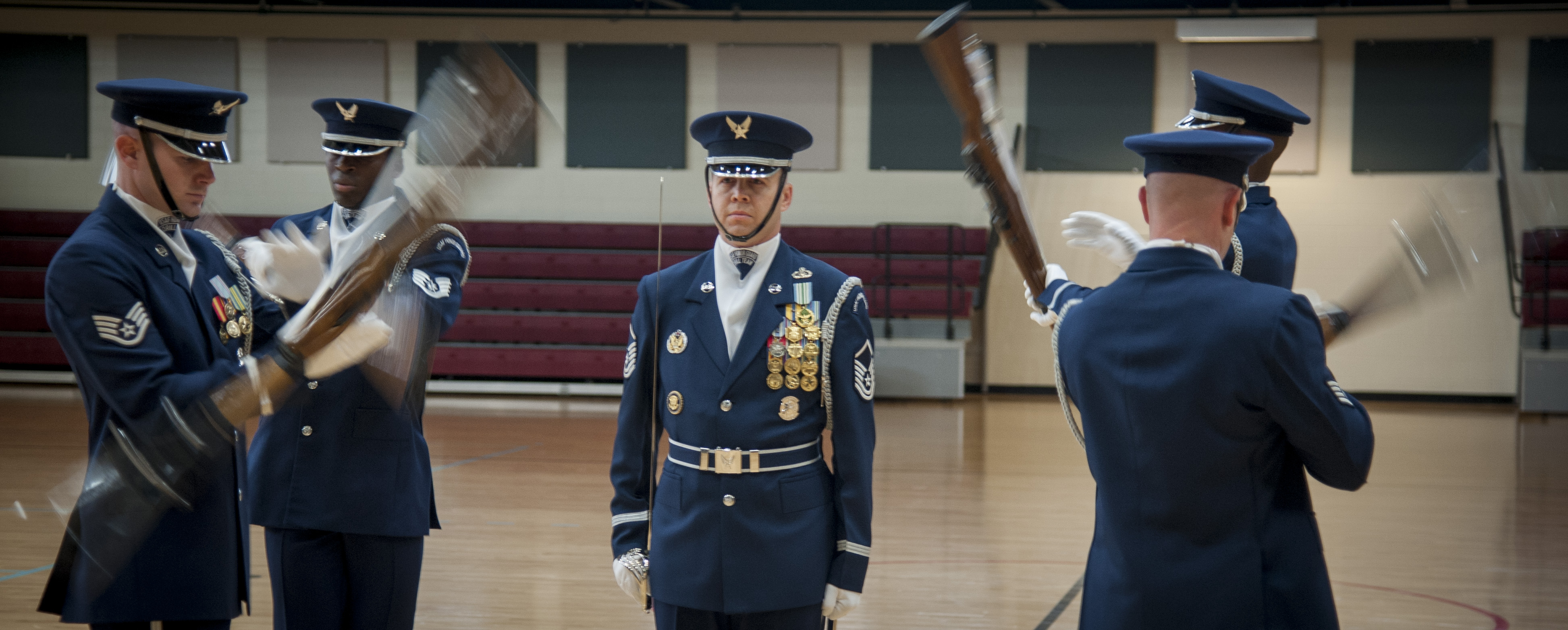 USAF Honor Guard drill team performs to cheering crowds