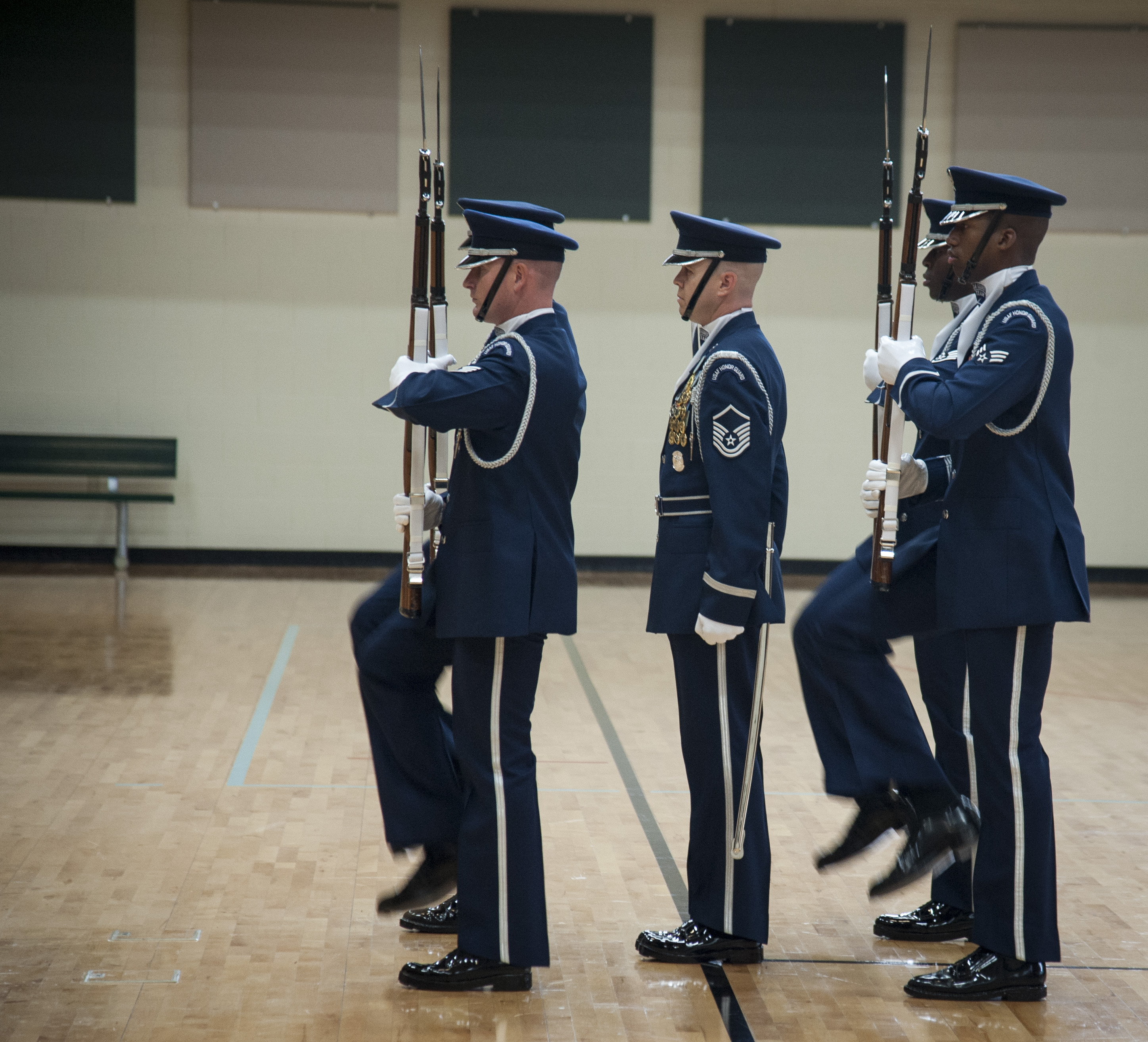 USAF Honor Guard drill team performs to cheering crowds
