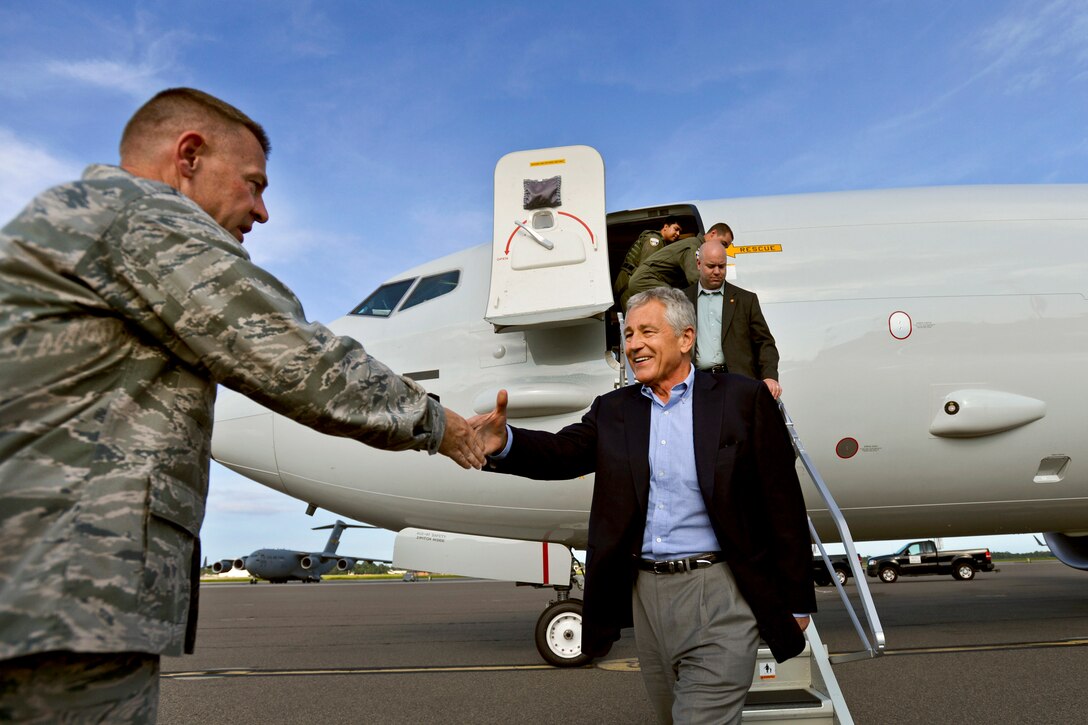 Air Force Col. Richard D. McComb, commander of the 628th Air Base Wing ...