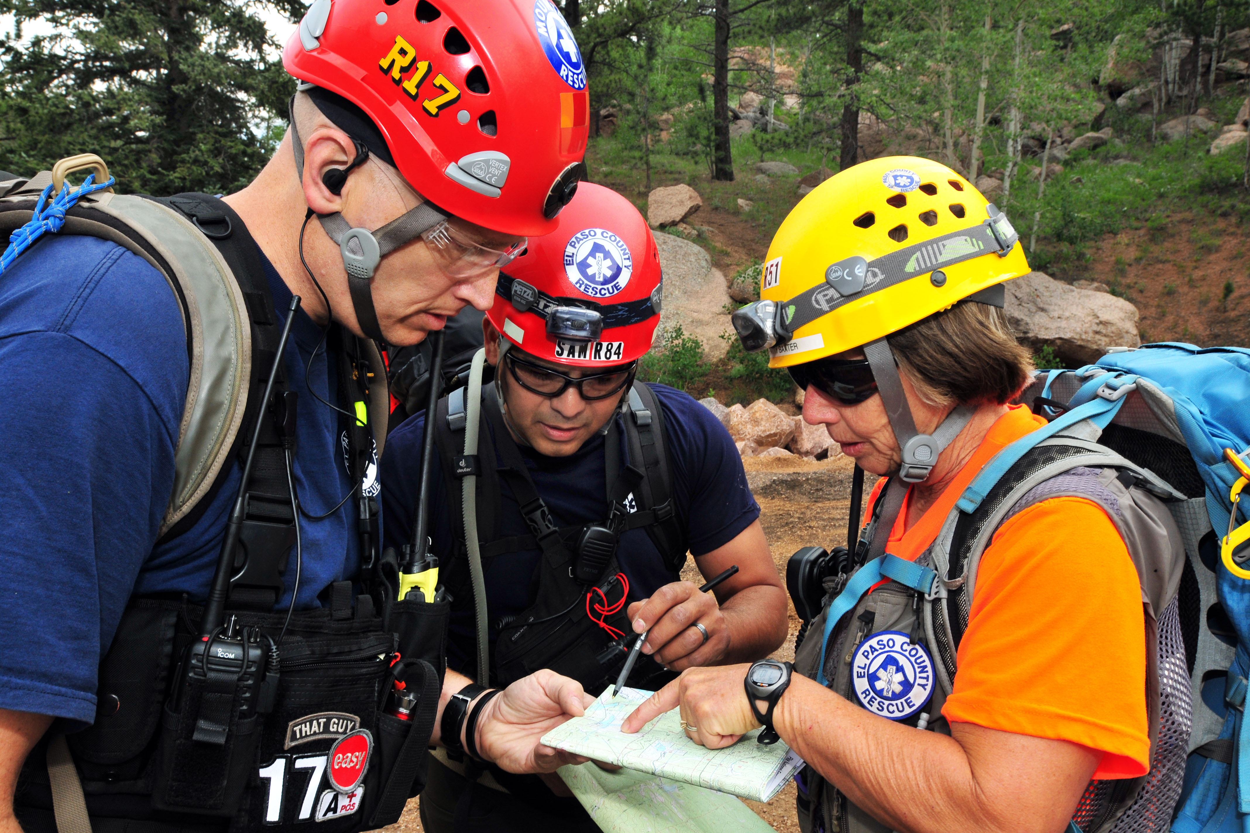 El Paso County search and rescue members Eric Babcock, left, Sam ...