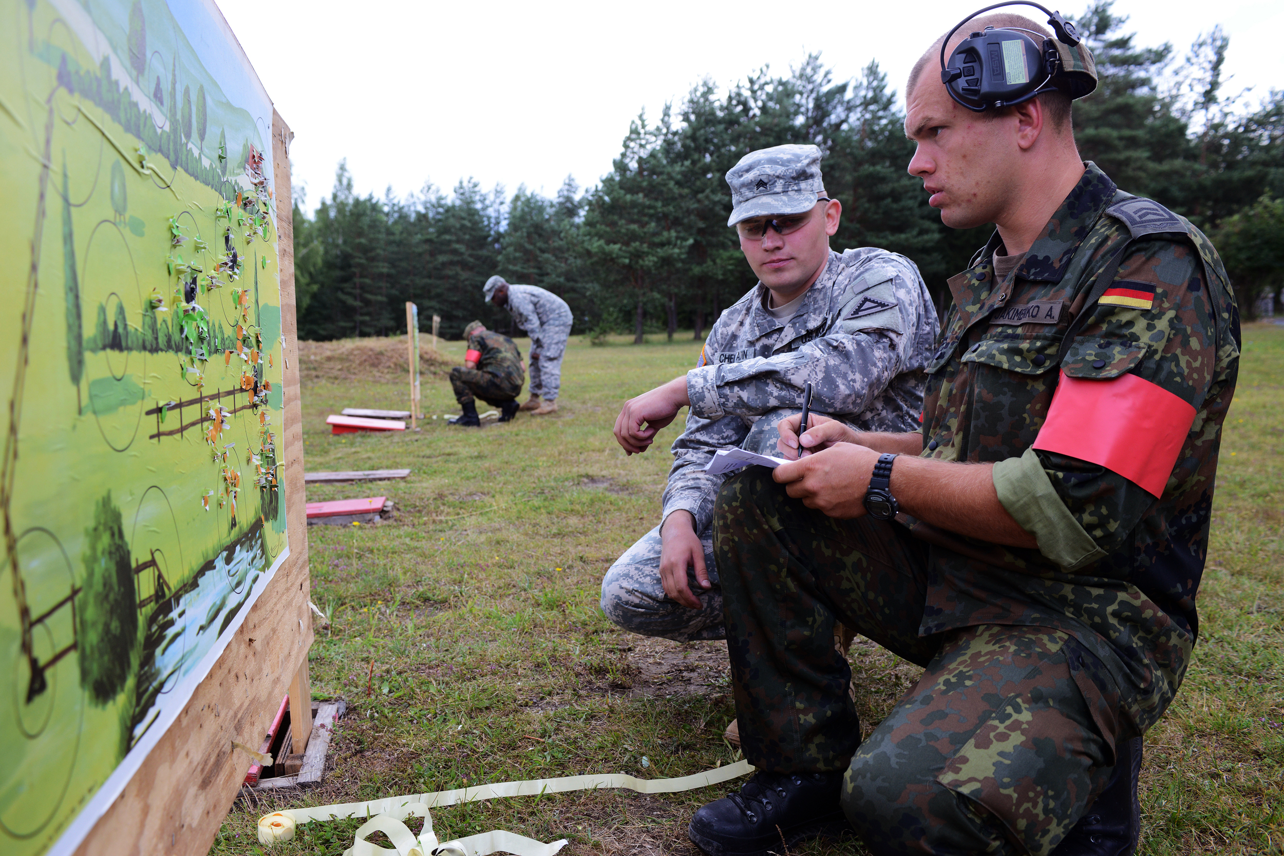 A German army staff sergeant, right, and U.S. Army Sgt. Mikhail ...